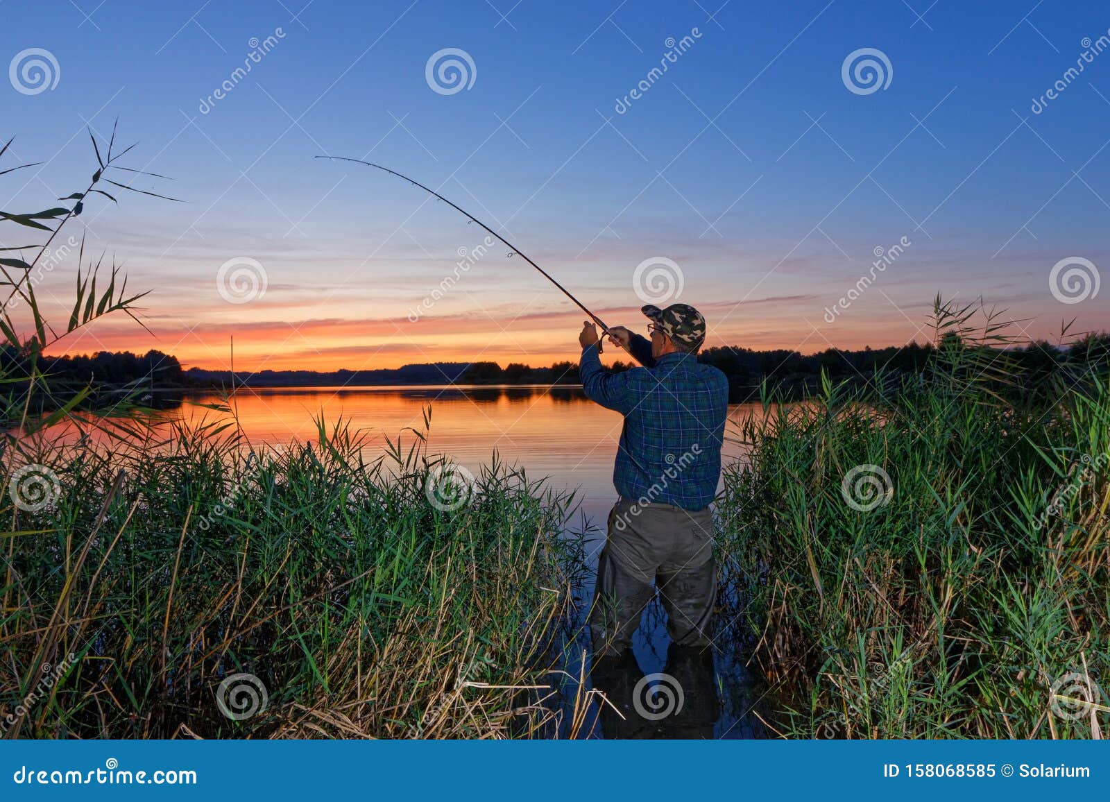 Angler stock image. Image of holiday, reed, spinning - 158068585