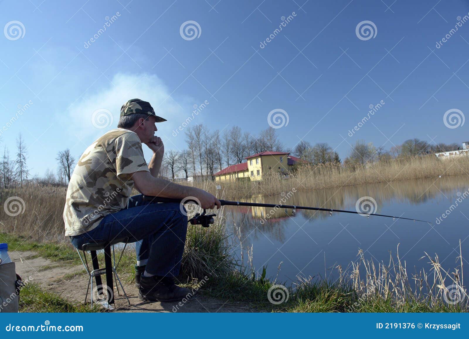 ANGLER MAN stock photo. Image of fishing, peaceful, blue - 2191376