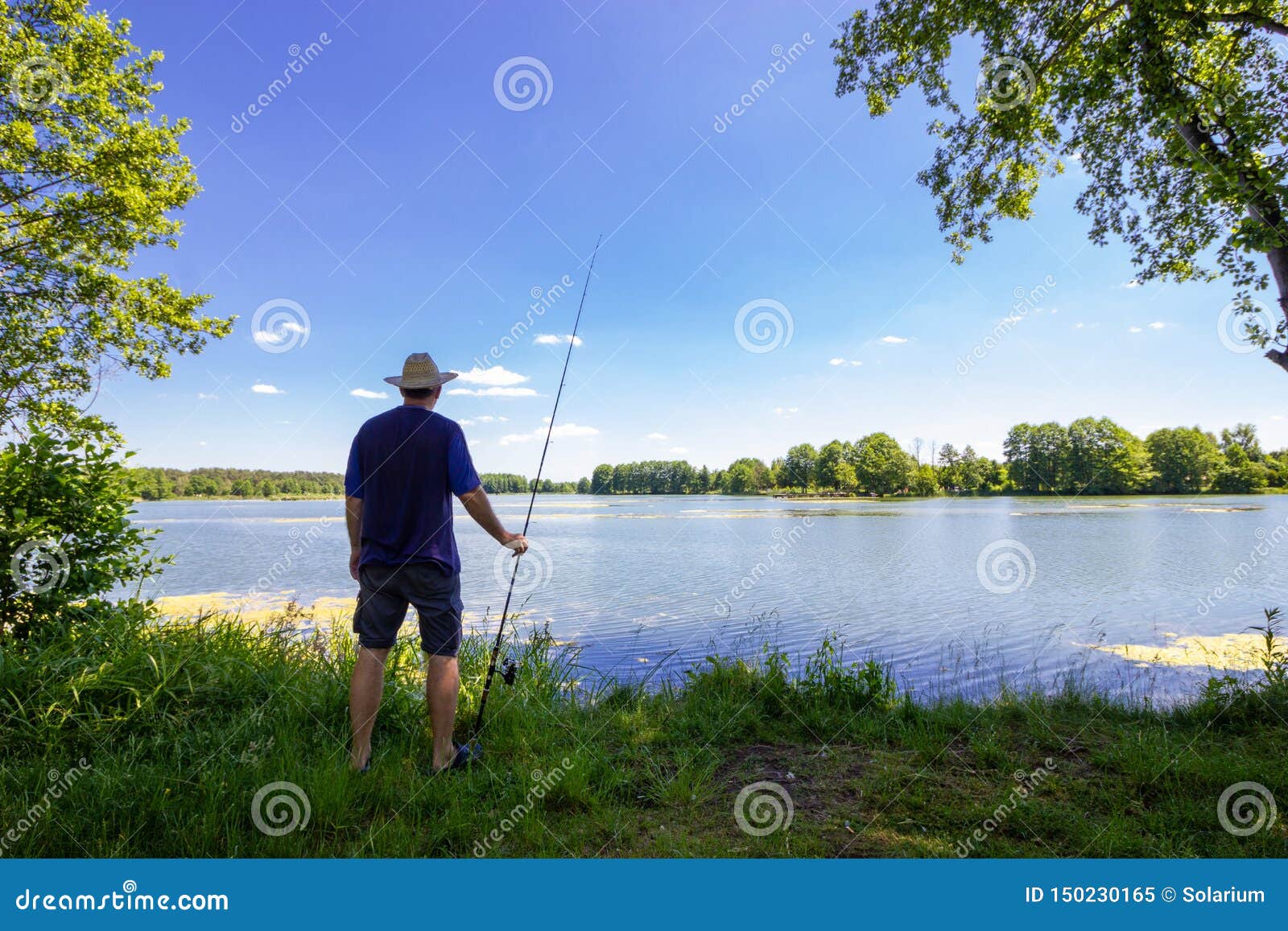 Angler stock image. Image of nature, alone, clouds, blue - 150230165