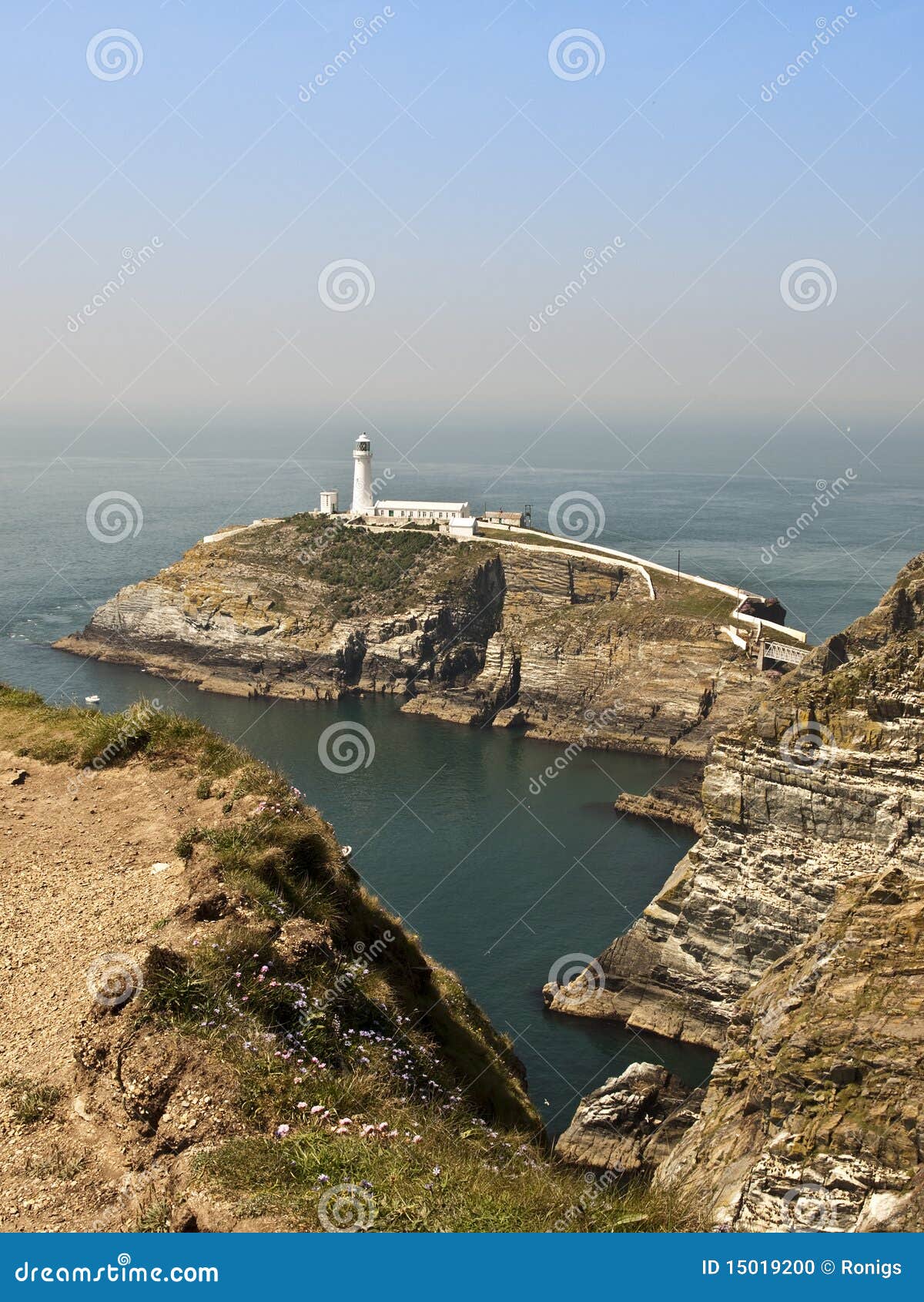 Anglesey Coast Lighthouse Wales Stock Photo - Image of building, cliffs ...