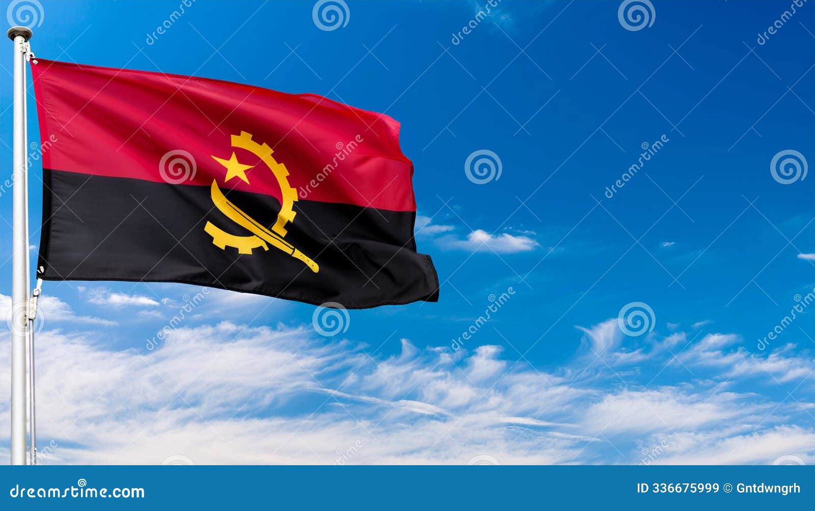 Angola Flag Waving with Blue Sky on Background and Space for Copy or ...