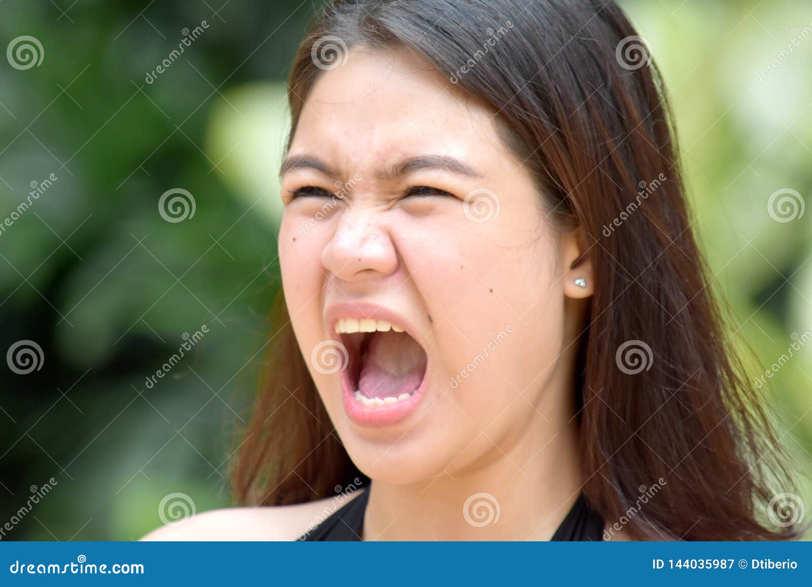 An Angry Adult Female stock image. Image of emotional - 144035987