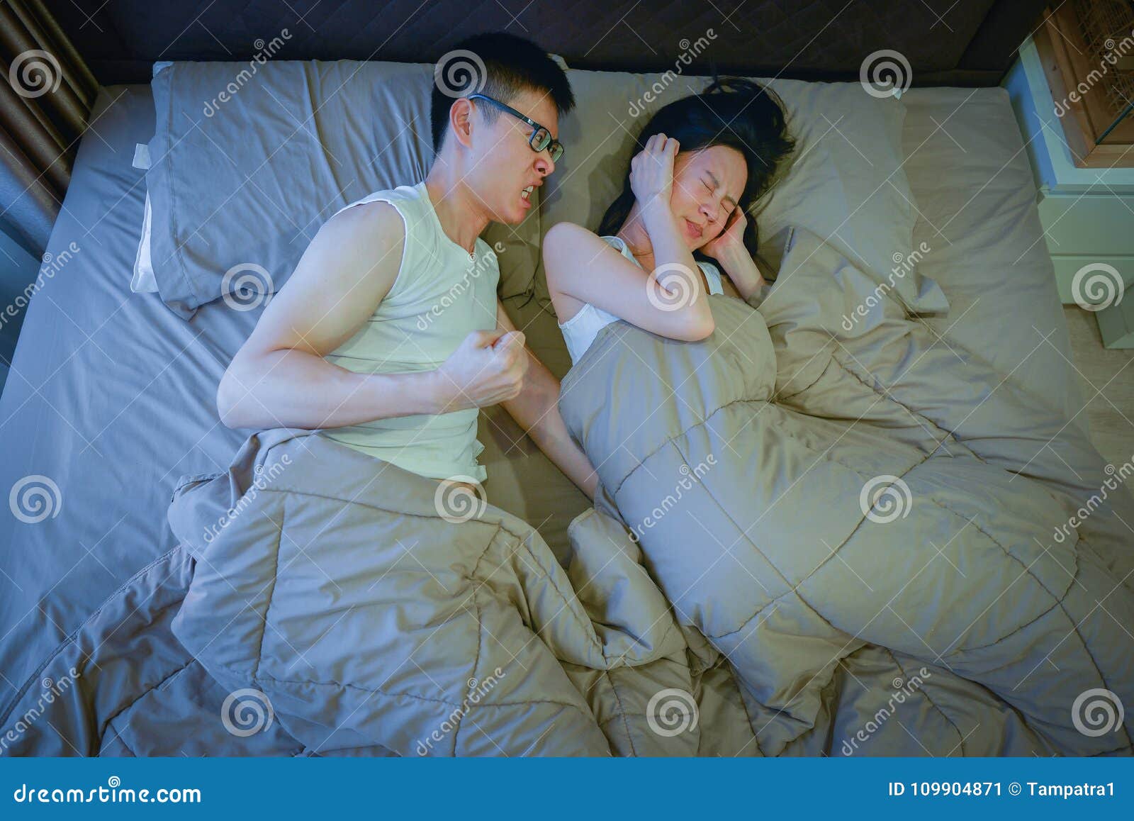 Angry Asian Couple Fighting on Bed at Night Stock Image - Image of ...
