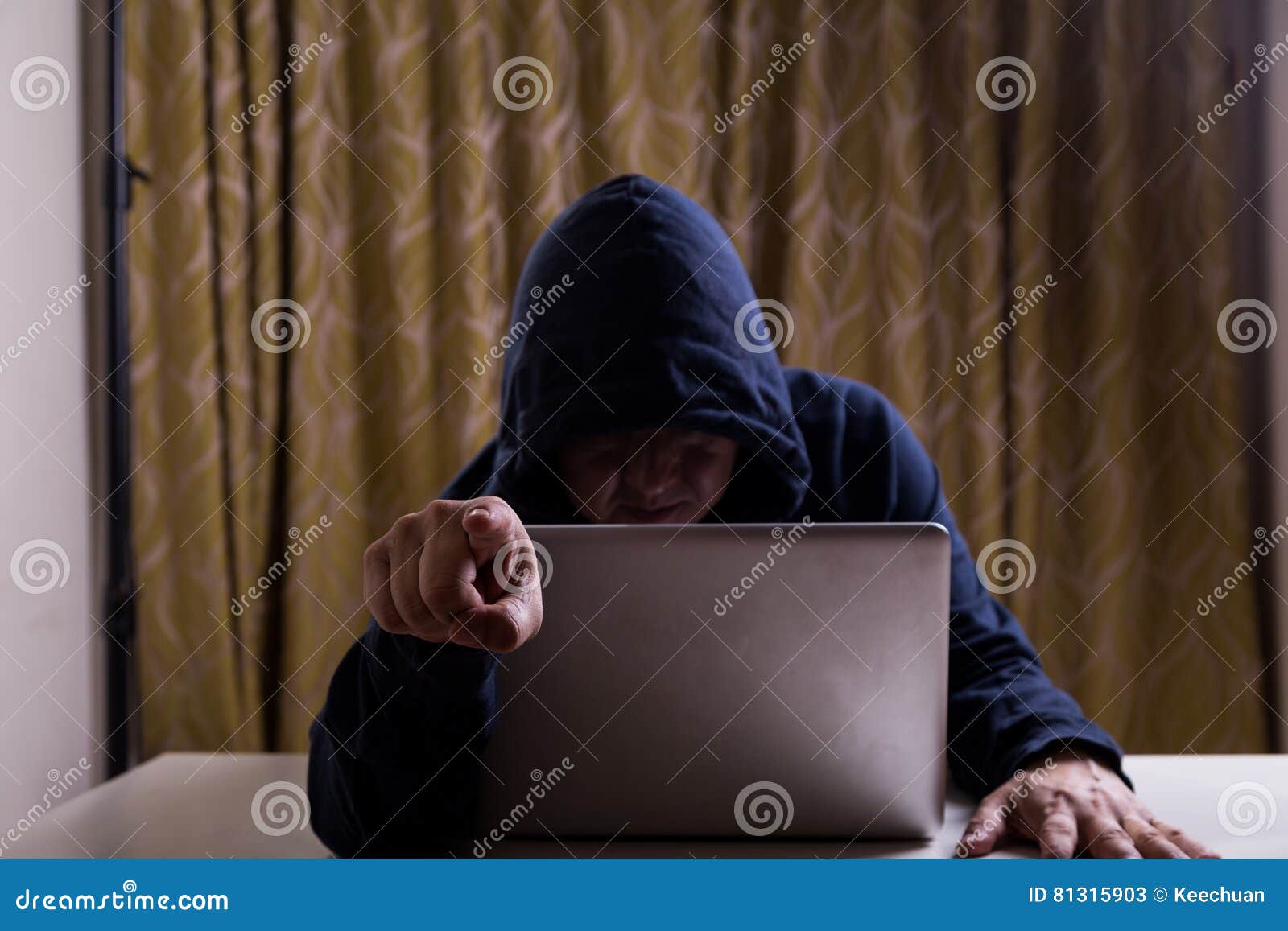 Angry Asian Hacker Pointing Finger To Audience while Hacking Net Stock ...