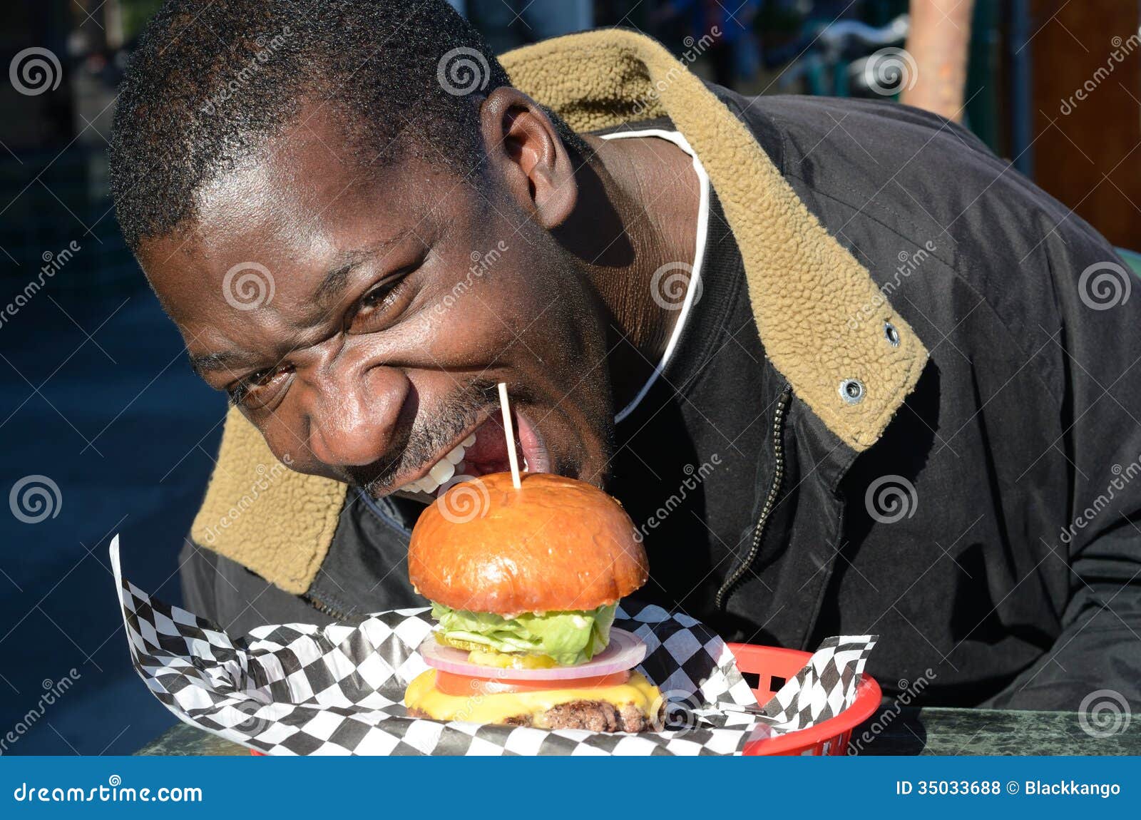 Angry Black Man Eating stock photo. Image of snack, hamburger - 35033688