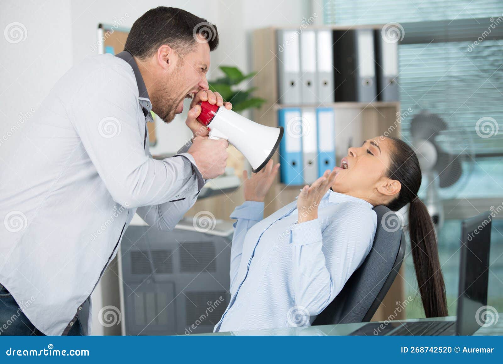 Angry Boss Shouting at Employee through Megaphone Stock Photo - Image ...