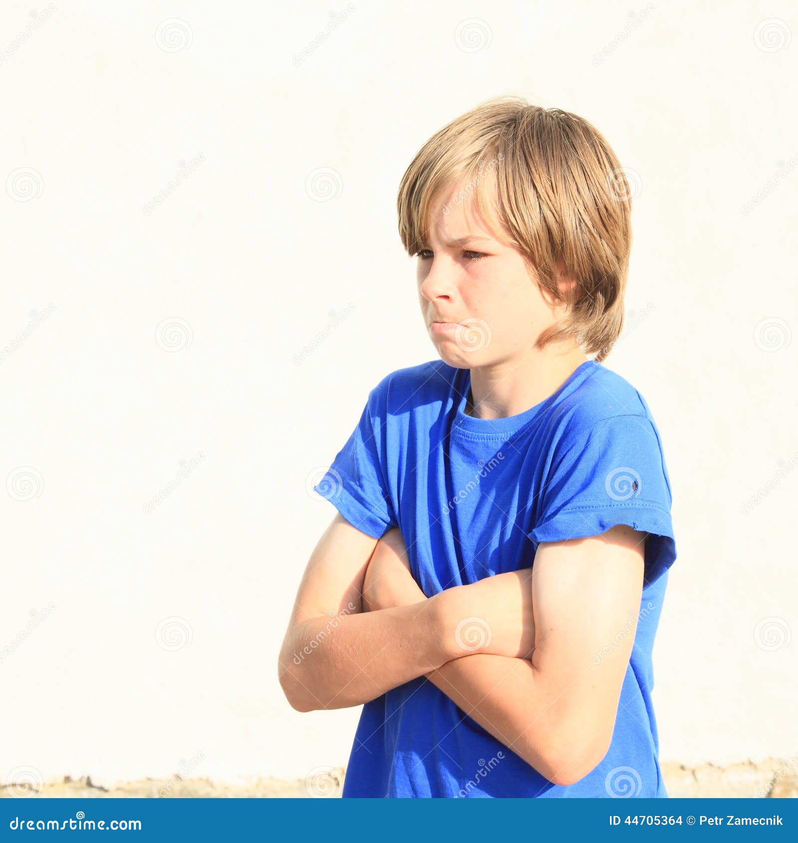 Angry boy stock photo. Image of shirt, little, blue, cross - 44705364