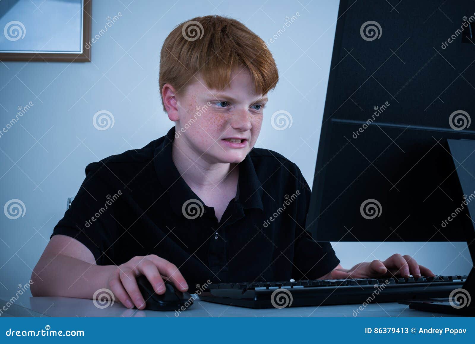 Angry Boy Working on Computer Stock Image - Image of child, people ...