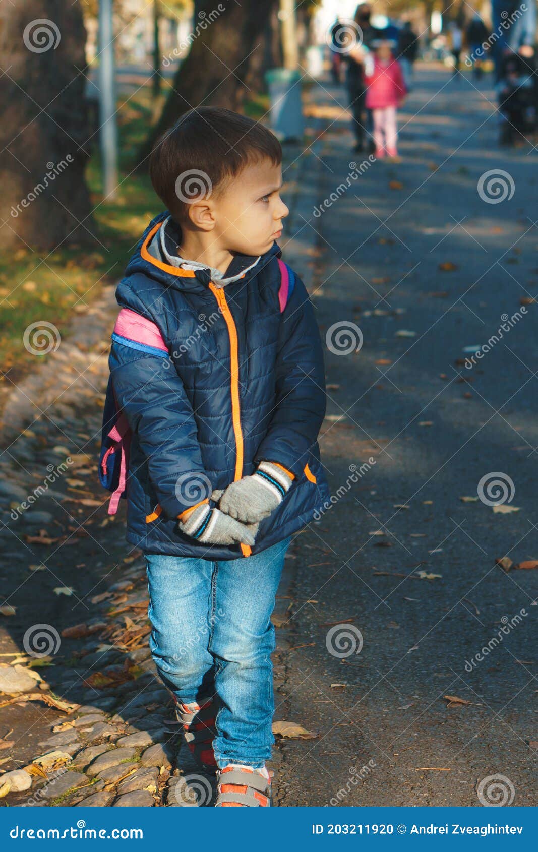 Angry boy walking in park stock photo. Image of model - 203211920