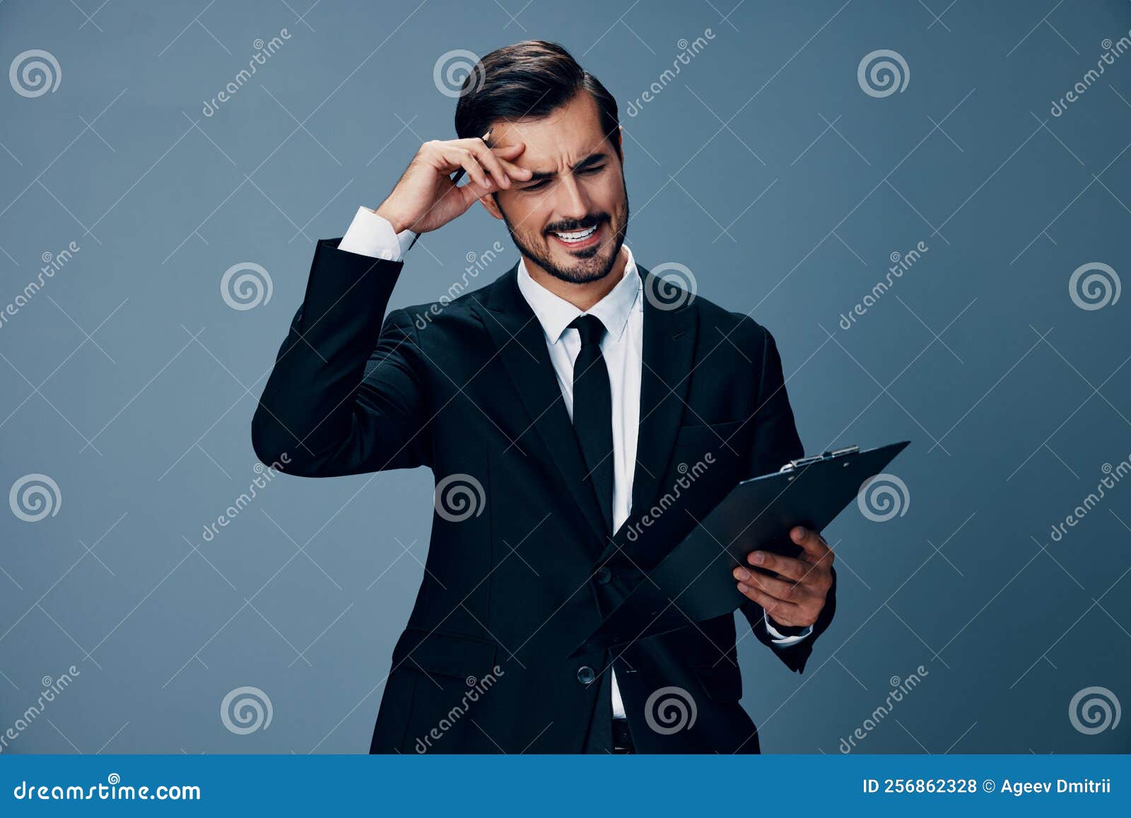 An Angry Business Man with a Headache is Holding a Folder of Notes in ...