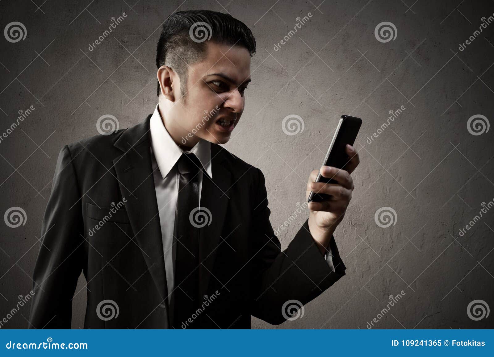 Angry Business Man Holding Phone Stock Image - Image of business ...