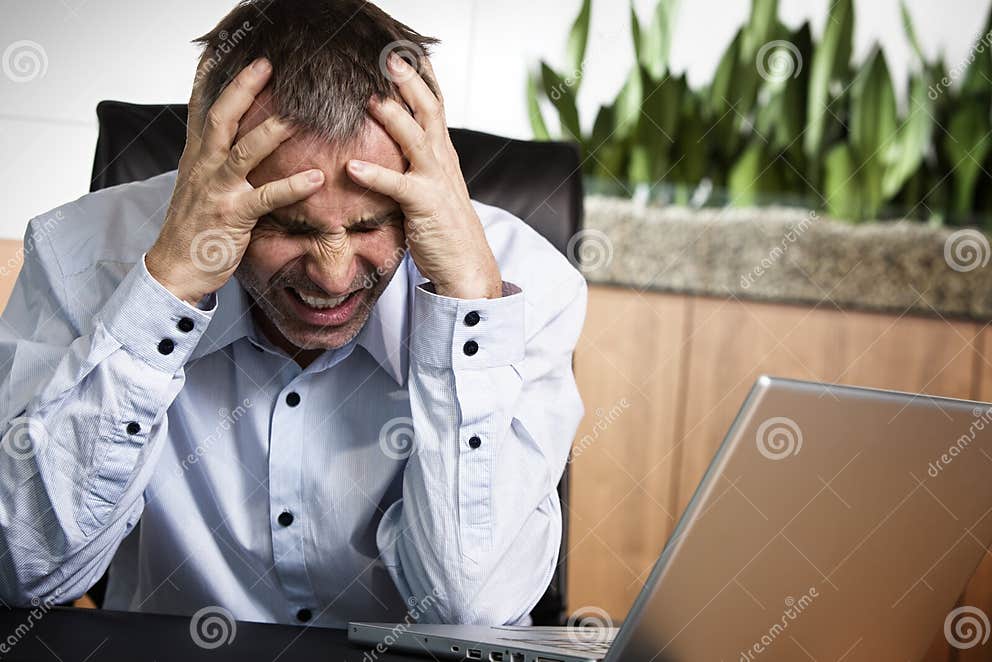 Angry Business Manager Infront of Office Computer. Stock Image - Image ...