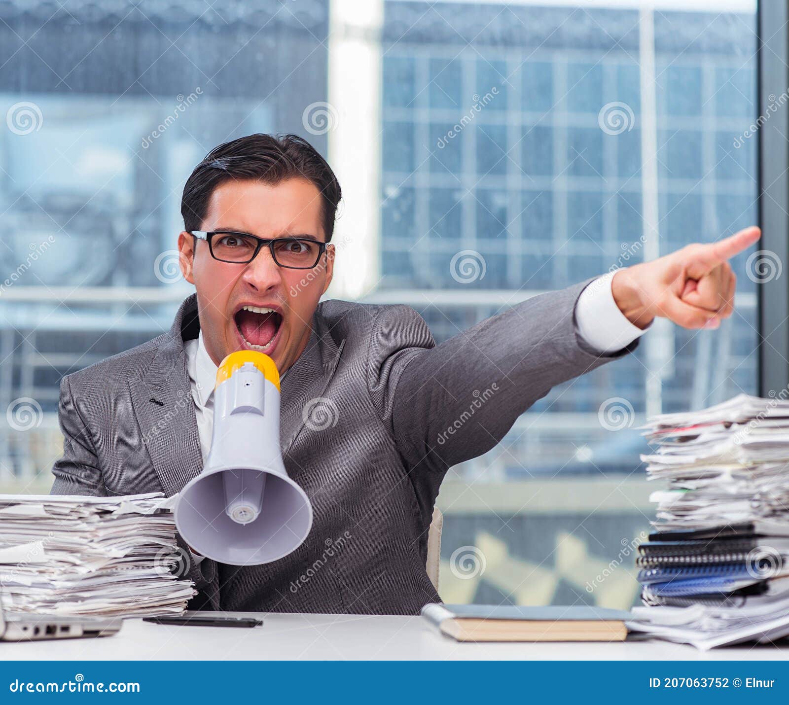 Angry Businessman with Loudspeaker in the Office Stock Photo - Image of ...