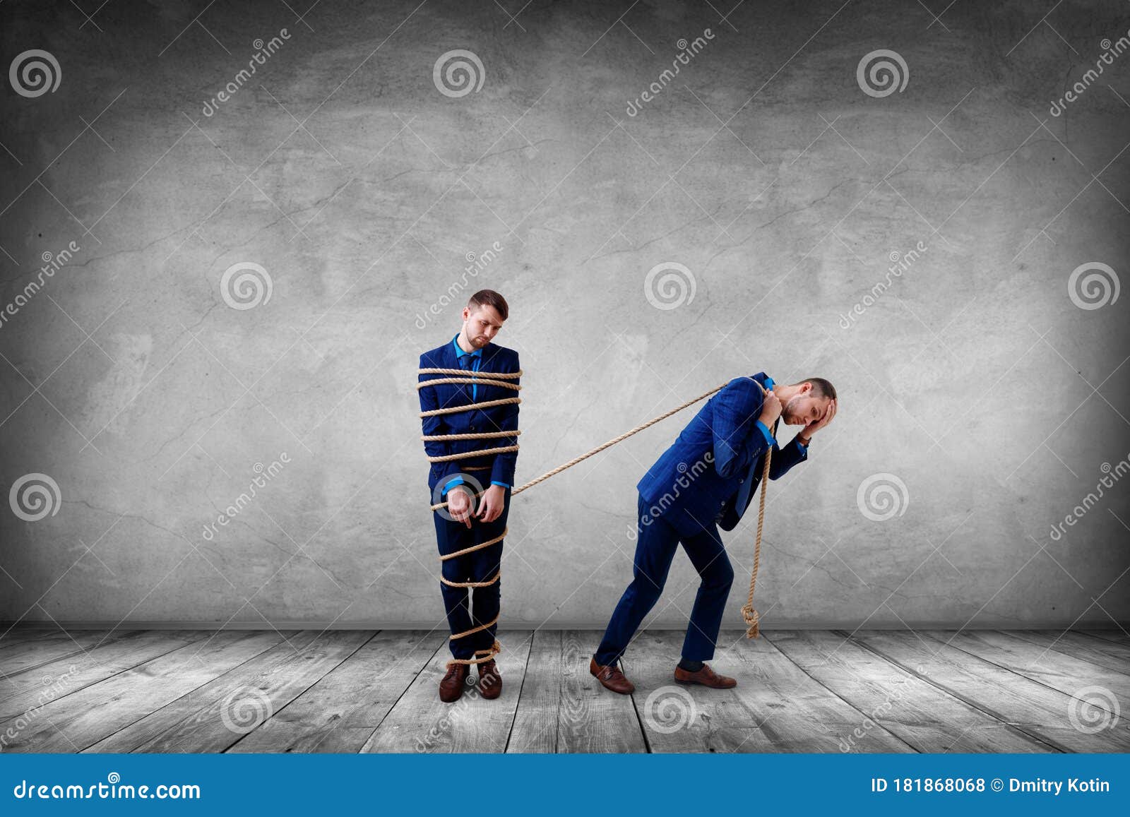 Angry Businessman Pulls Tied Himself with a Rope. Stock Photo - Image ...