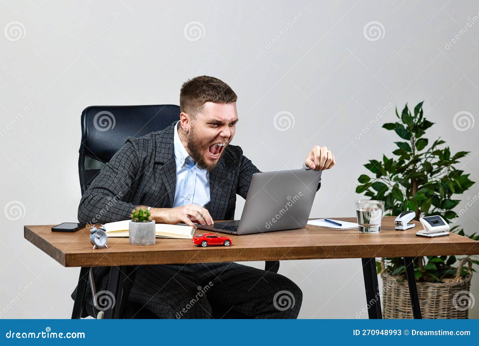 Man Sitting on Chair at Table and Resting, Using Laptop Stock Image ...