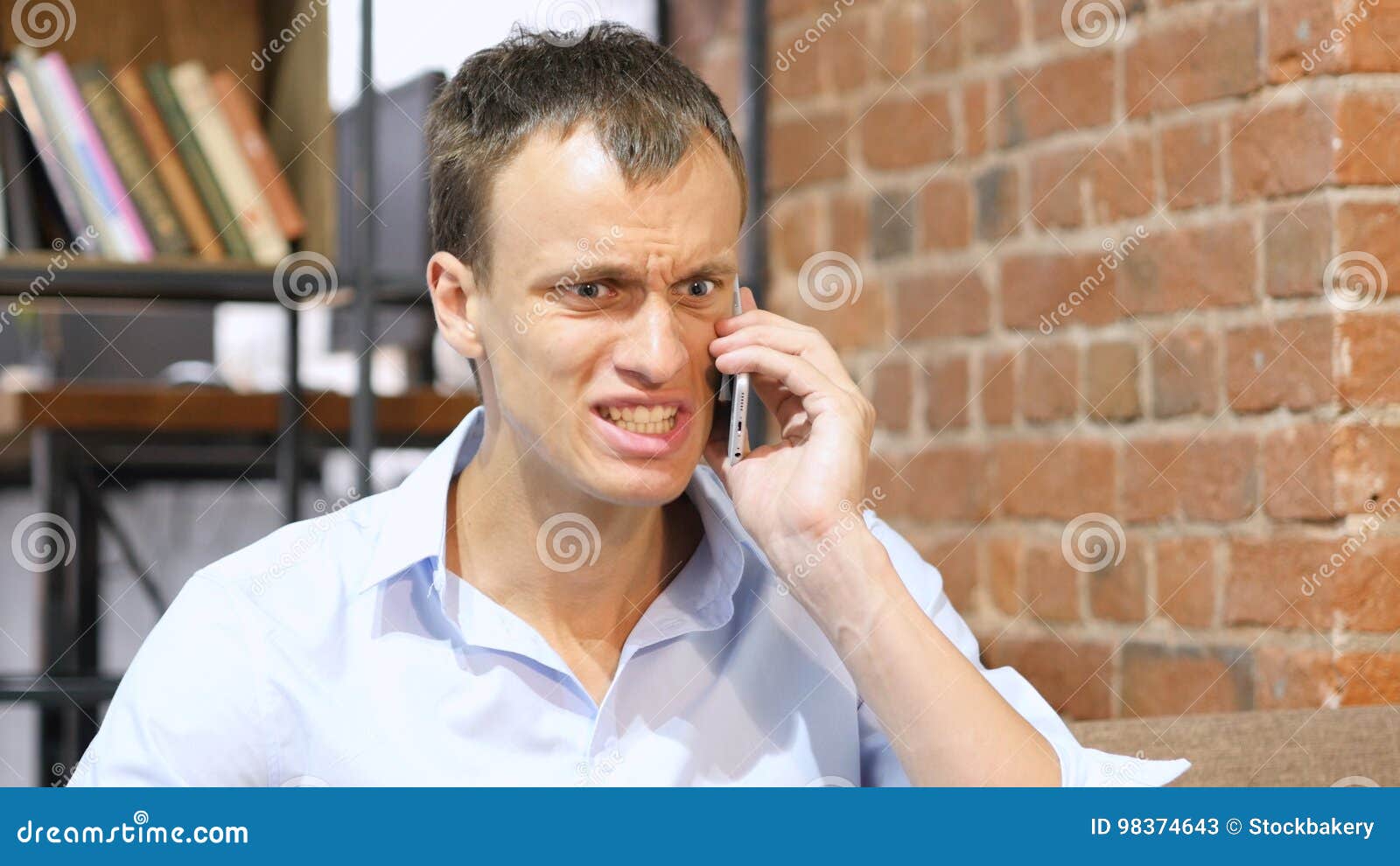 Angry Businessman Talking on the Phone.Upset Depressed Businessman ... Angry Businessman Talking on the Phone.Upset Depressed Businessman ...