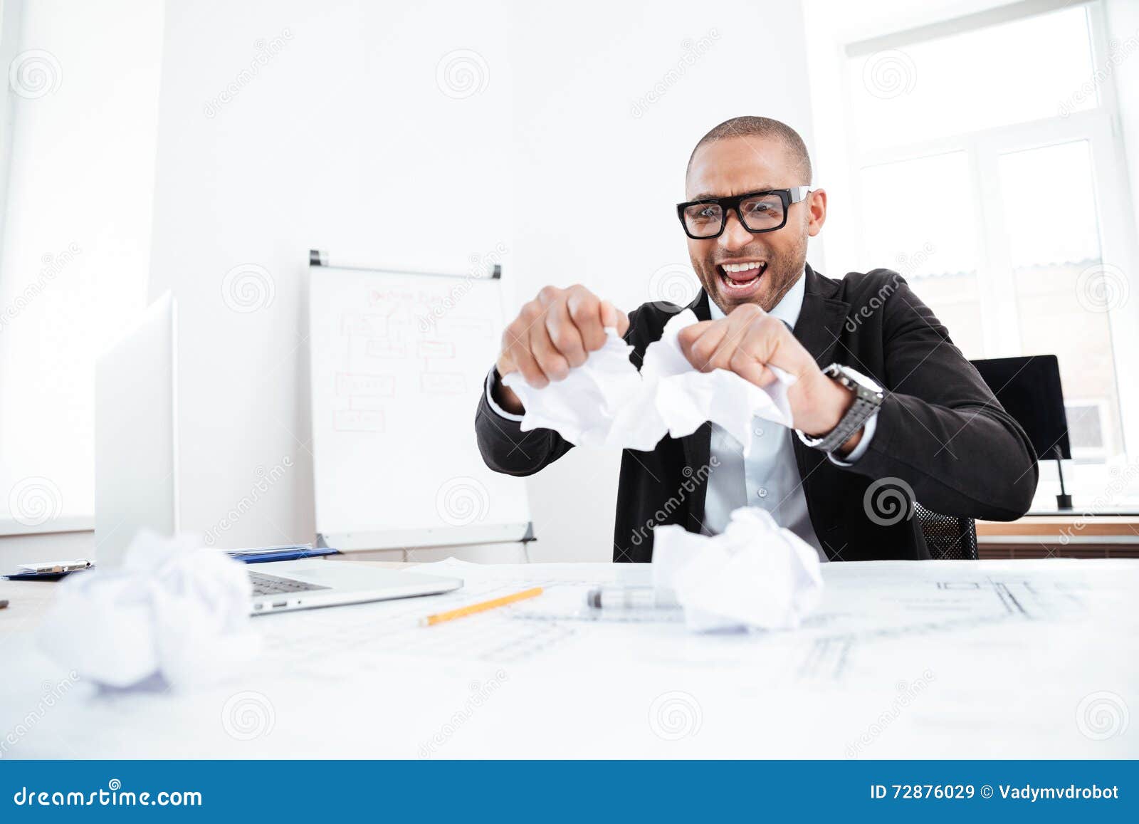 Angry Businessman Tearing Up a Document in Office Stock Image - Image ...