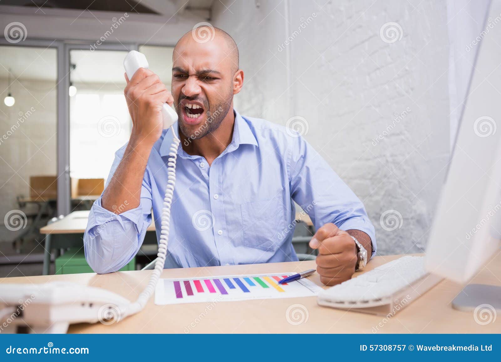 Angry Businessman Using Telephone at Desk Stock Image - Image of desk ...