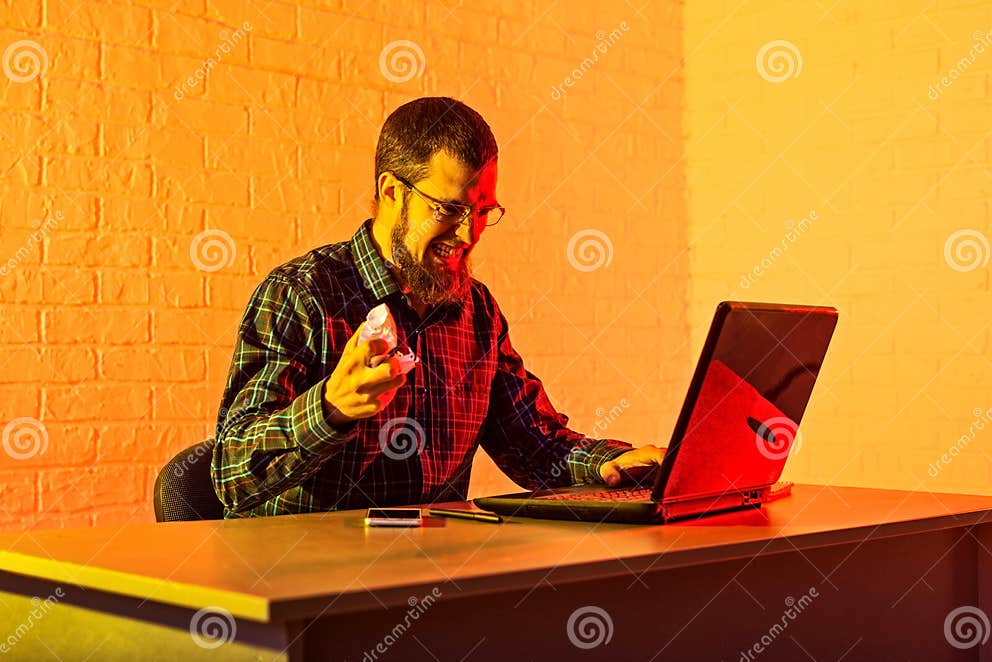 Angry Cheerless Man Expressing His Emotions While Tearing Down A Sheet