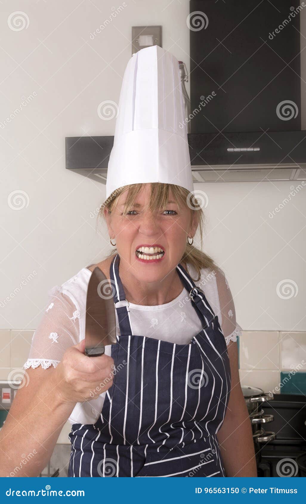 Angry Chef Holding a Large Knife Stock Photo - Image of professional ...