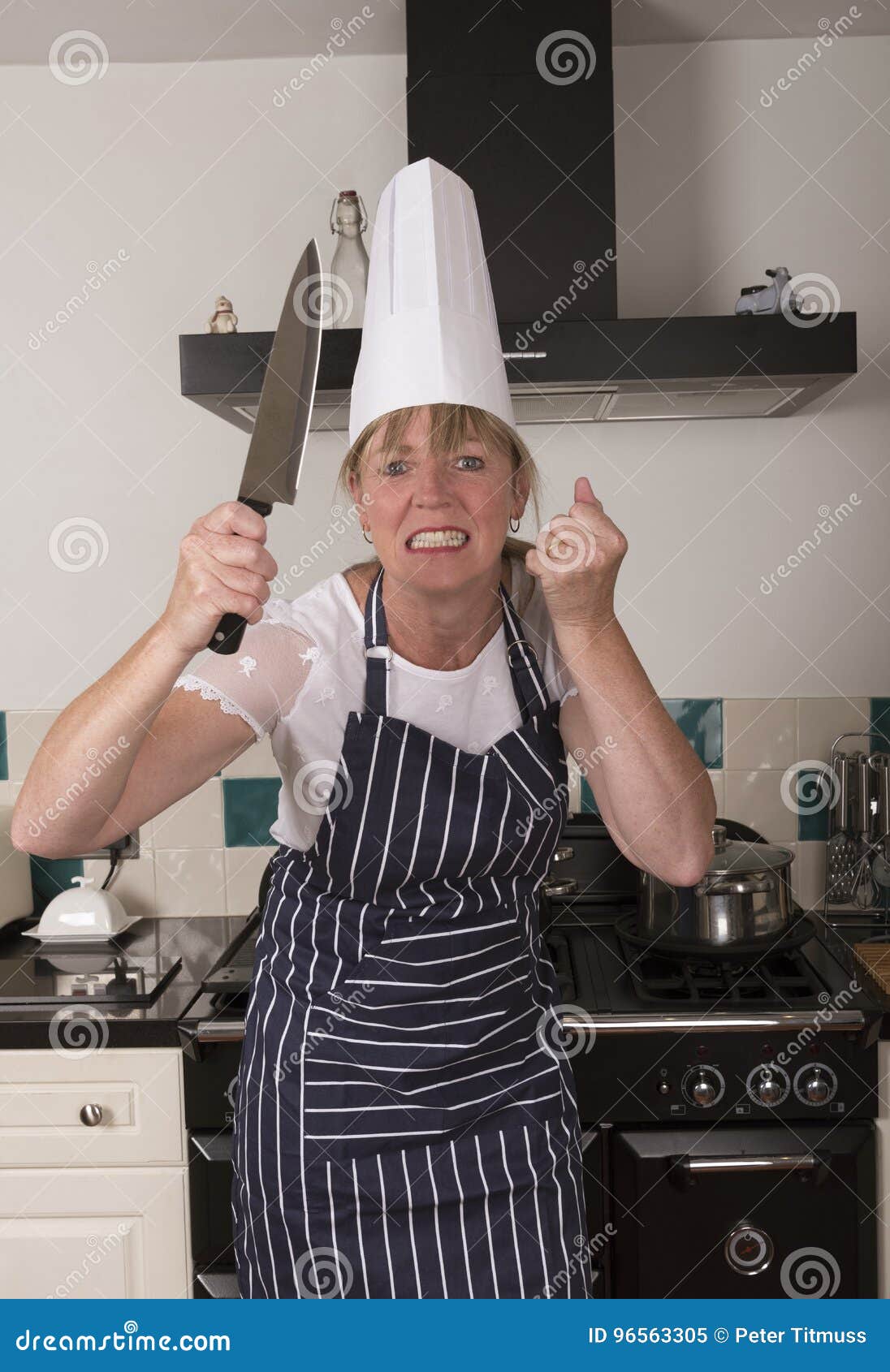 Angry Chef Holding a Large Knife Stock Image - Image of knife, apron ...