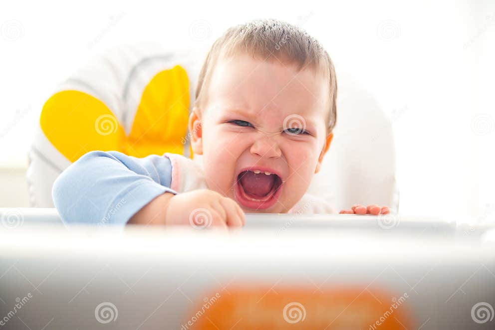 Angry child being hungry stock photo. Image of toddler - 19892842