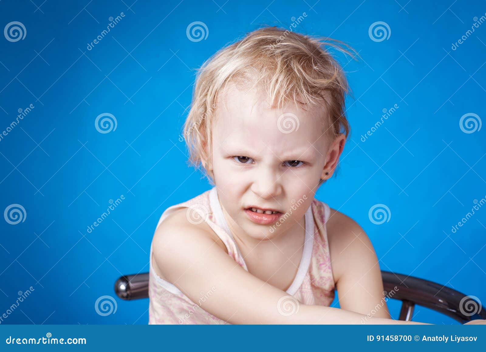 Angry Child on a Blue Background Stock Photo - Image of emotions ...