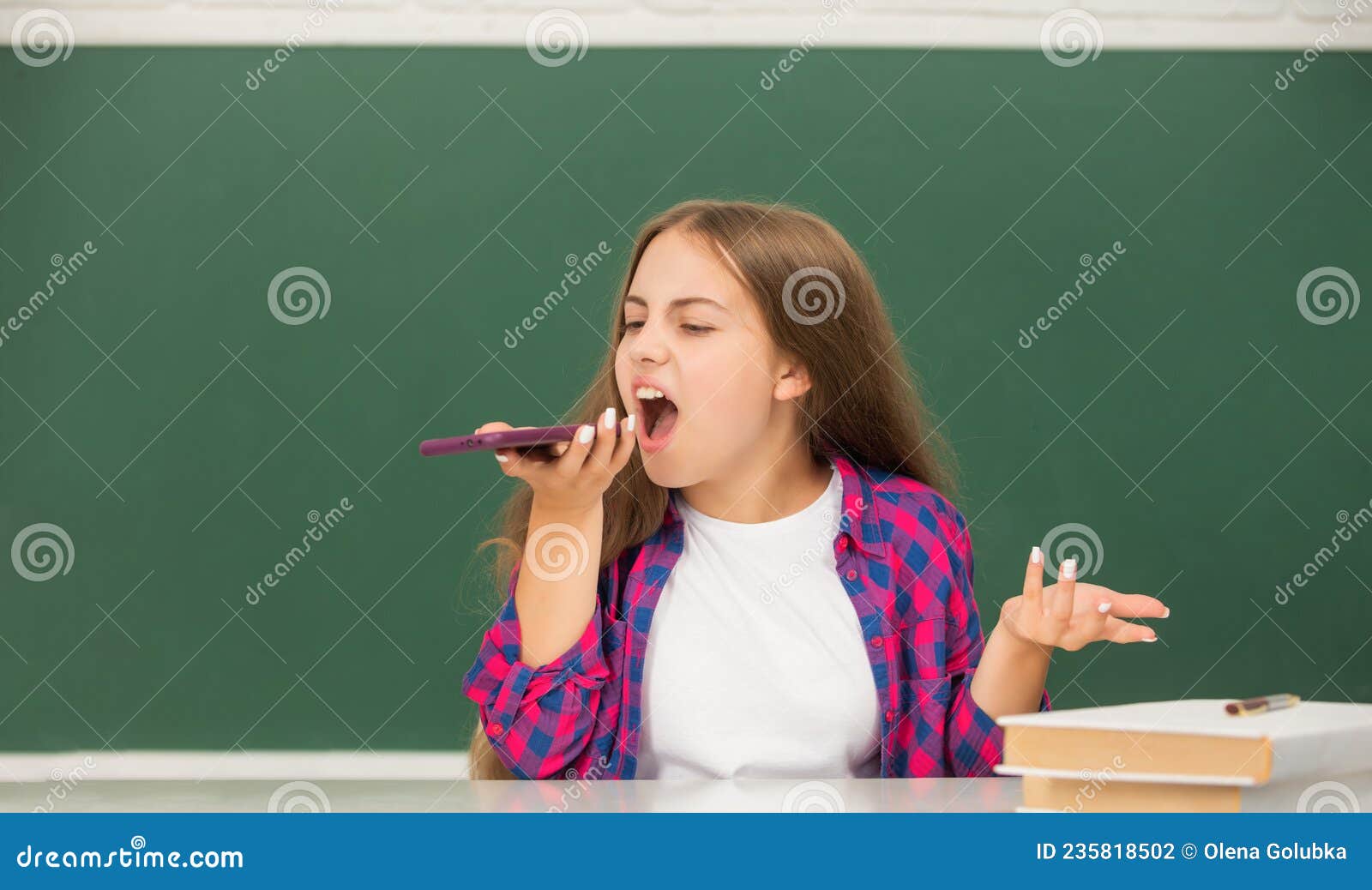 Angry Child at School Talking on Phone on Blackboard Background, Phone ...