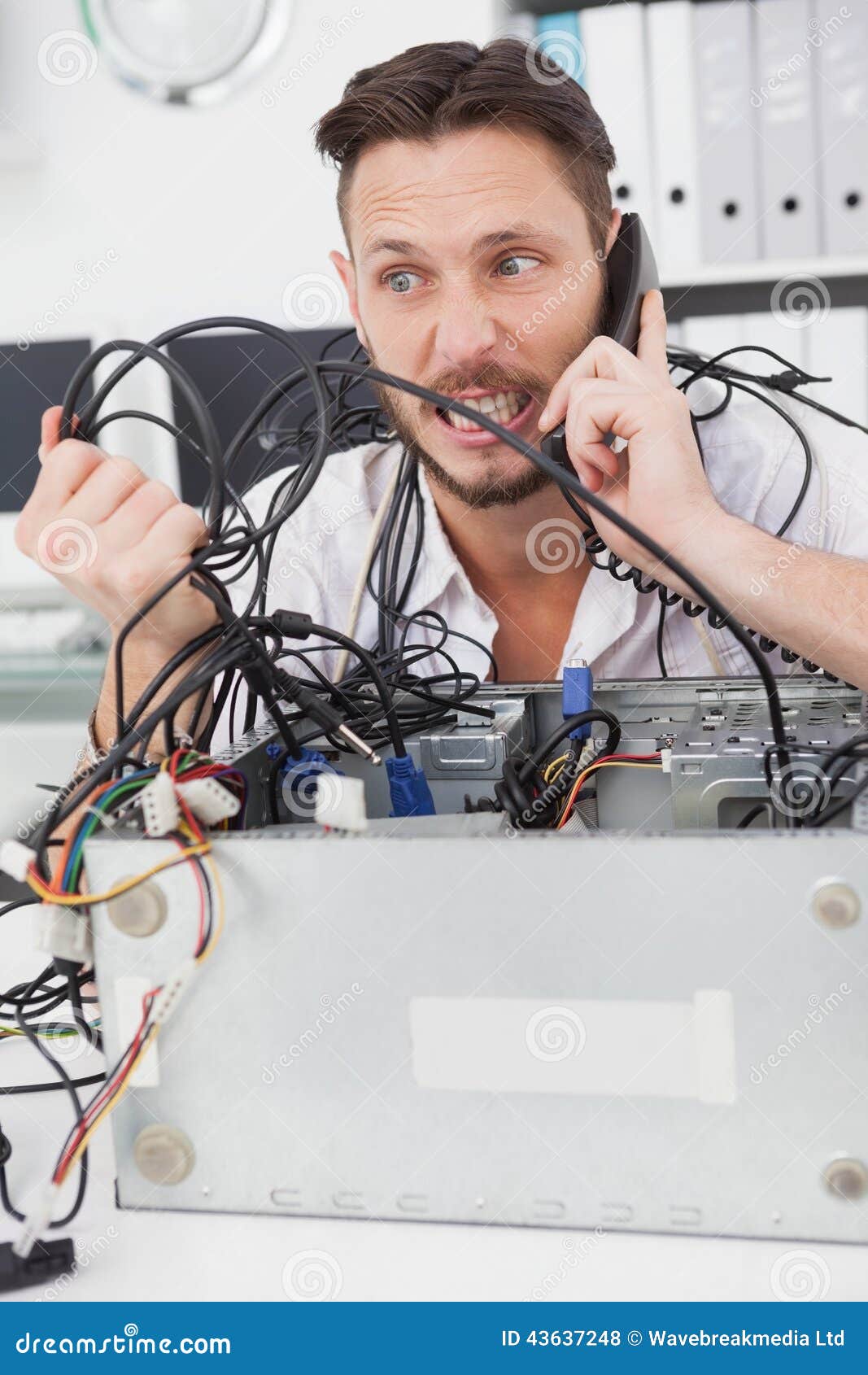 Angry Computer Engineer Making a Call Stock Photo - Image of workplace ...