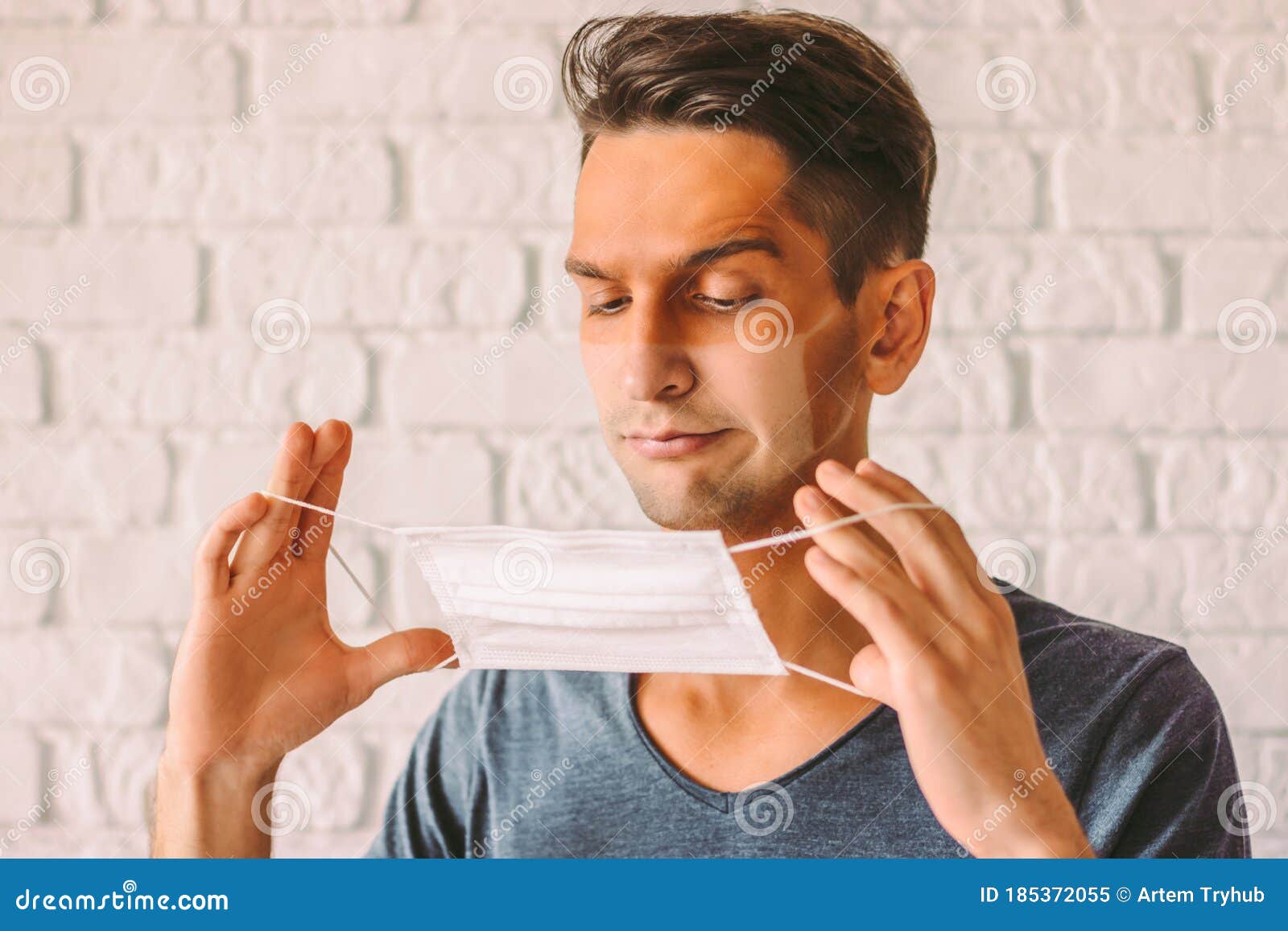 Angry Confused Man Wearing Mask on Face with Funny Sun Tanned Lines ... Angry Confused Man Wearing Mask on Face with Funny Sun Tanned Lines ...