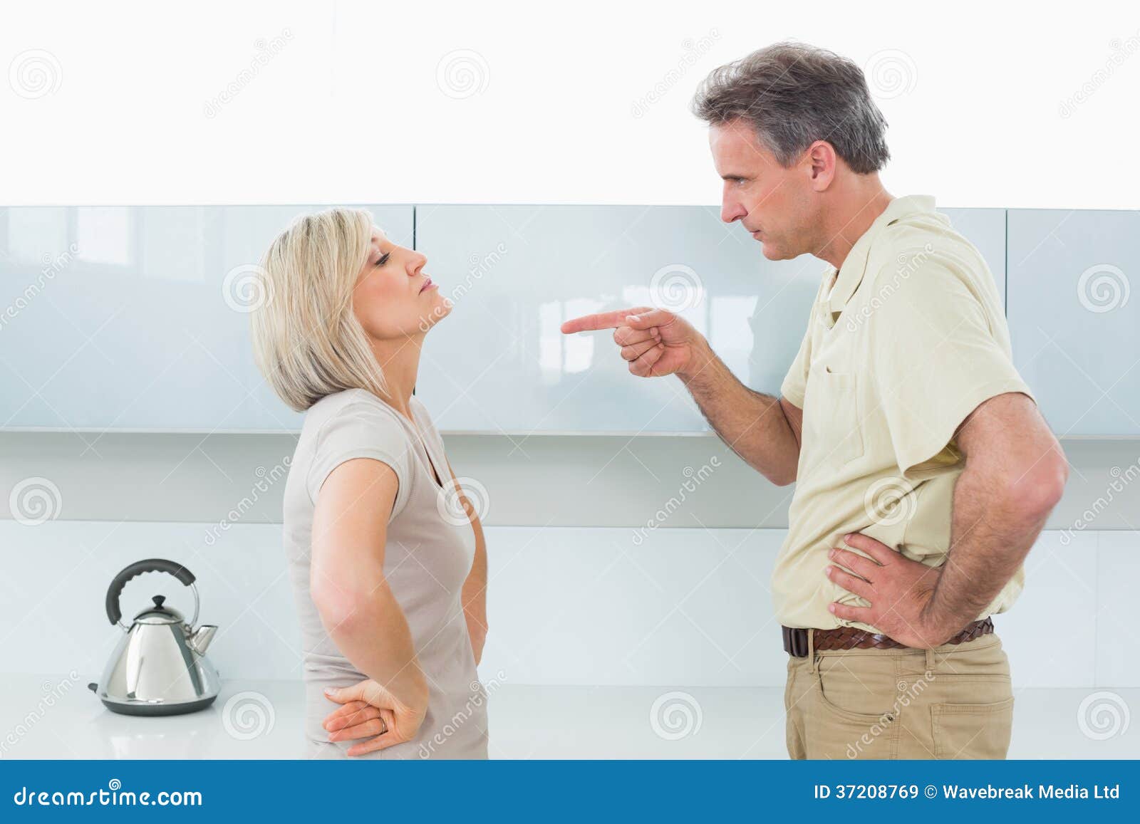 Angry Couple Arguing in Kitchen Stock Image - Image of view, mature ...