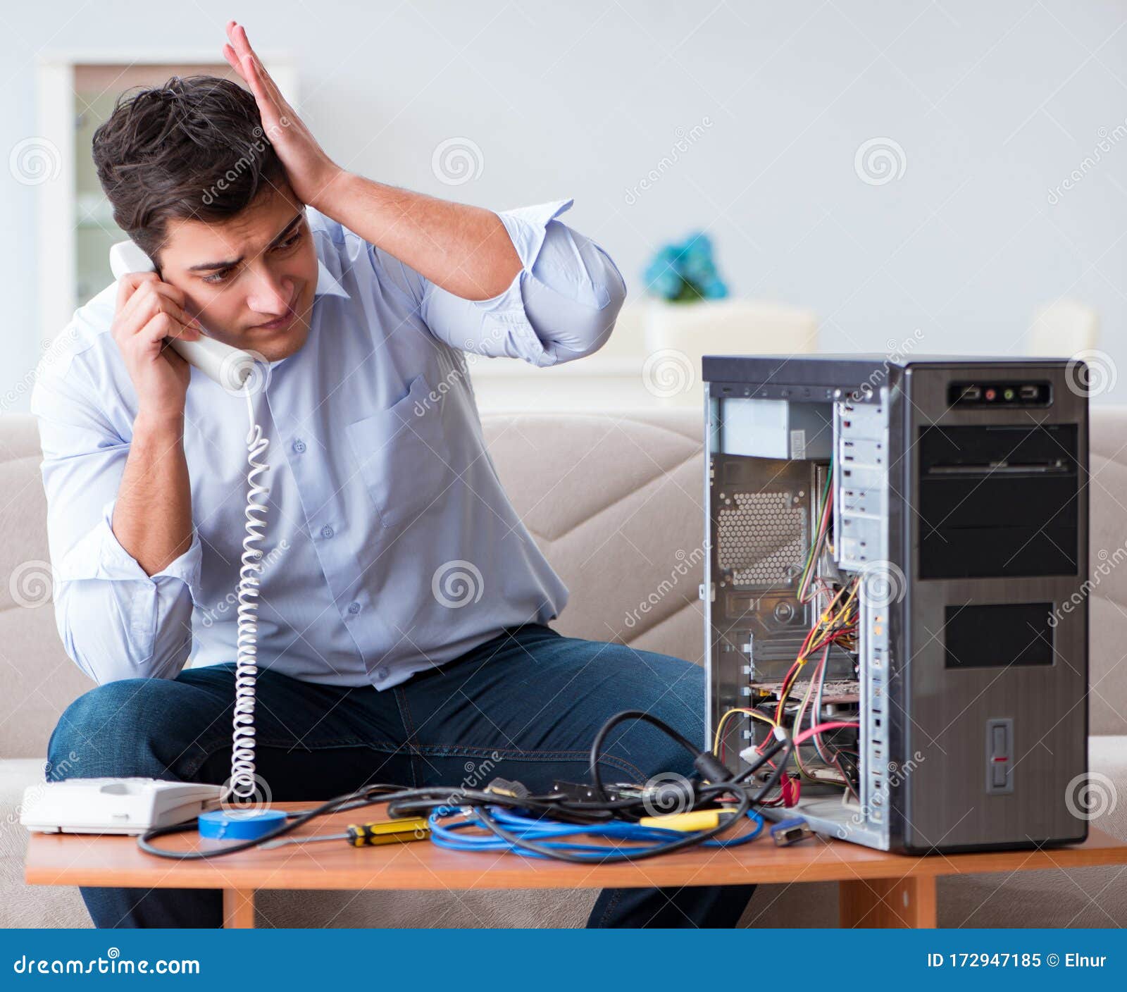 Angry Customer Trying To Repair Computer with Phone Support Stock Image ...