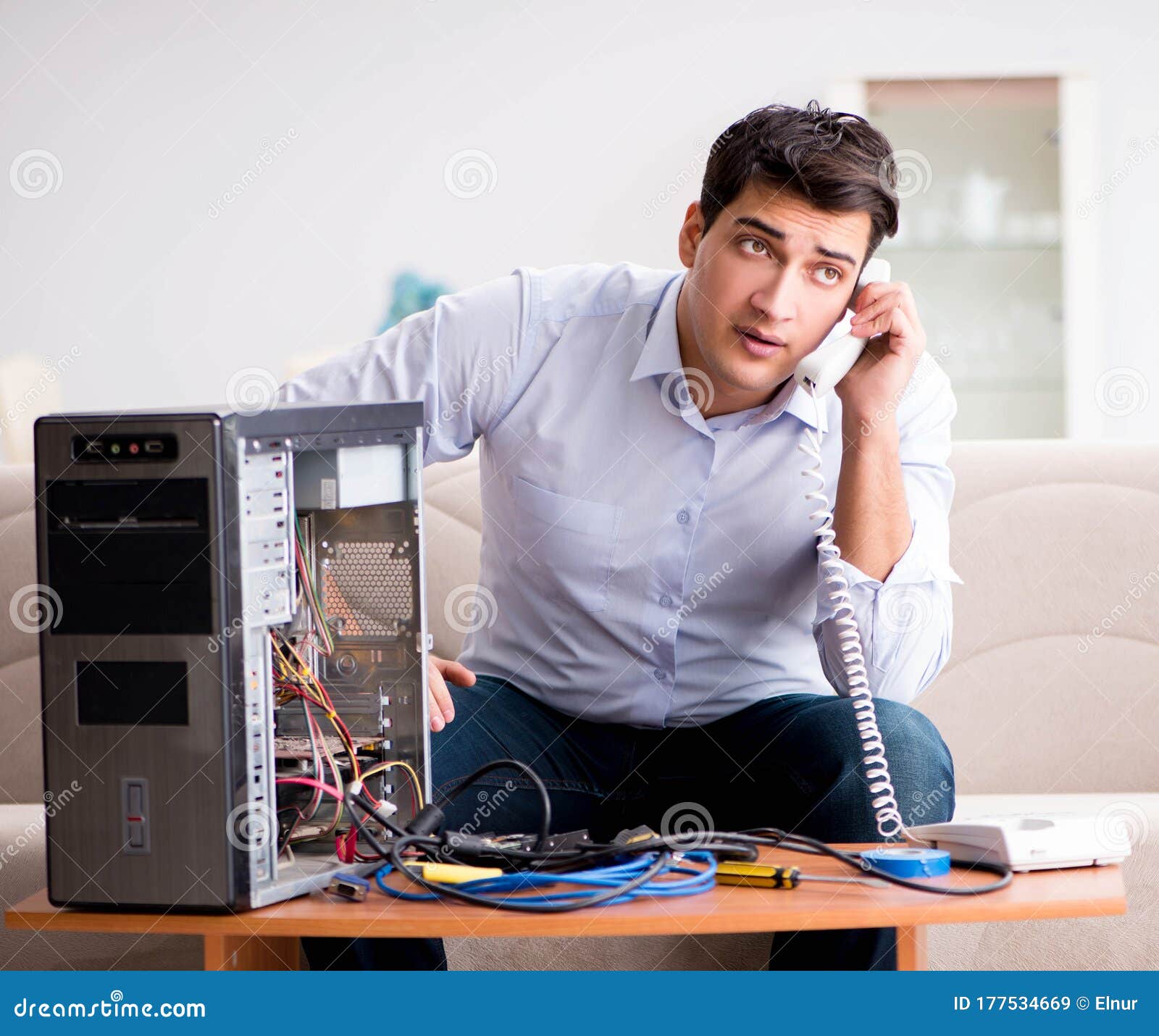 Angry Customer Trying To Repair Computer with Phone Support Stock Image ...