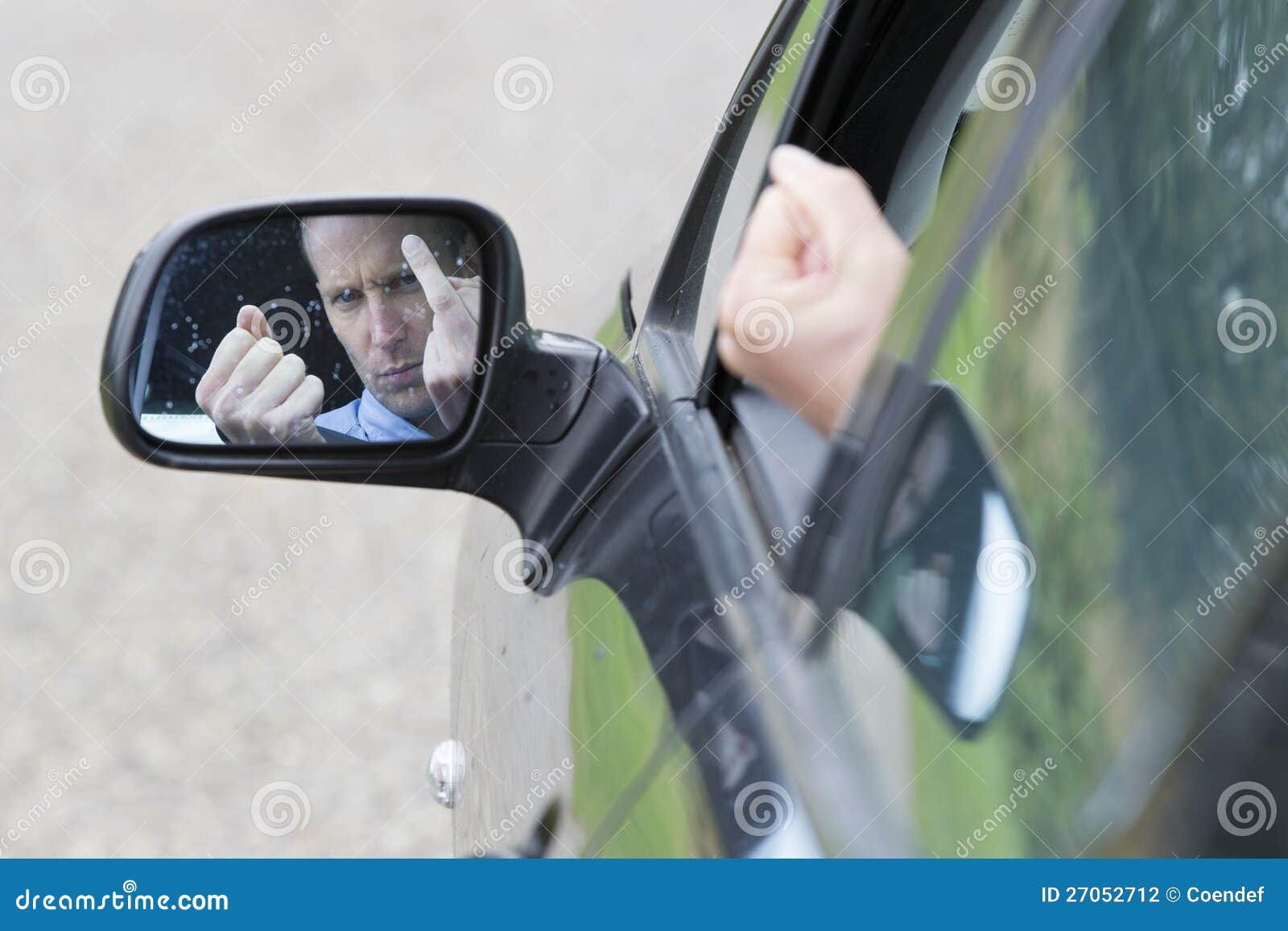 Angry driver giving finger stock photo. Image of cross - 27052712