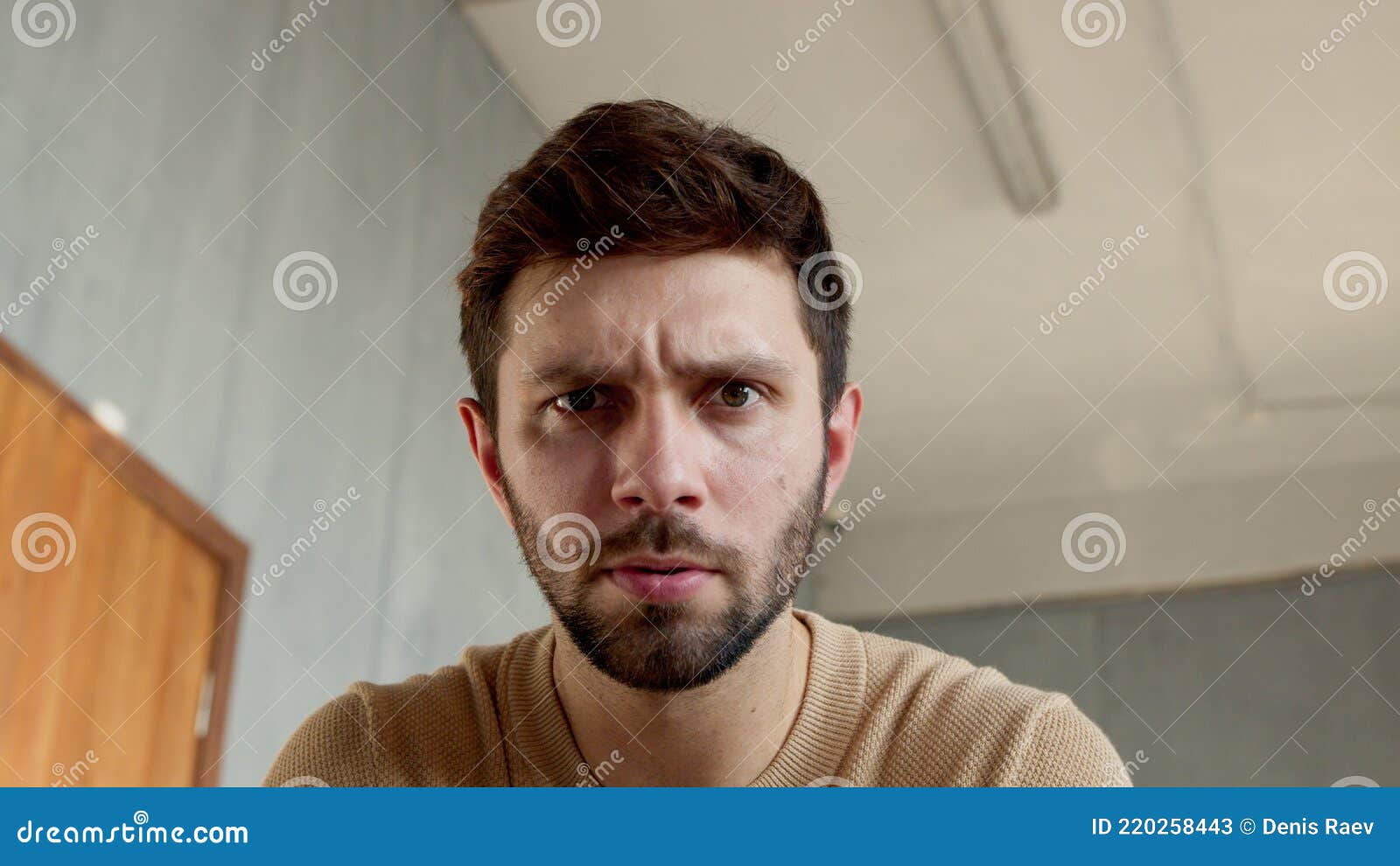 Angry Emotional Man Looking at the Camera Stock Image - Image of device ...