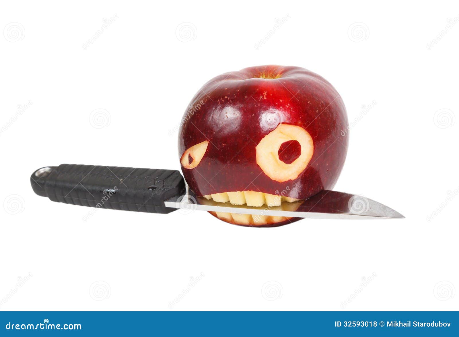 Angry Face is Carved on an Apple and a Knife Stock Photo - Image of ...