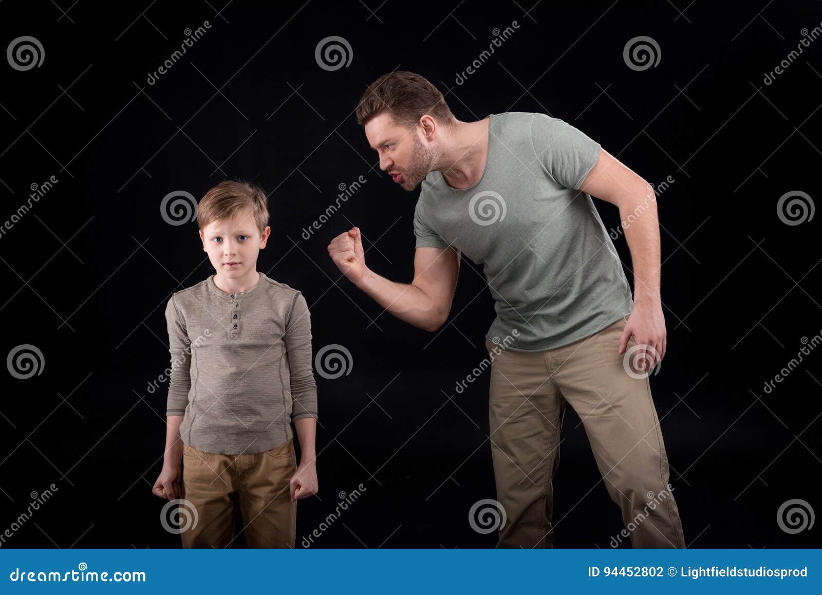 Angry Father Threatening and Gesturing To Scared Little Son, Stock ...
