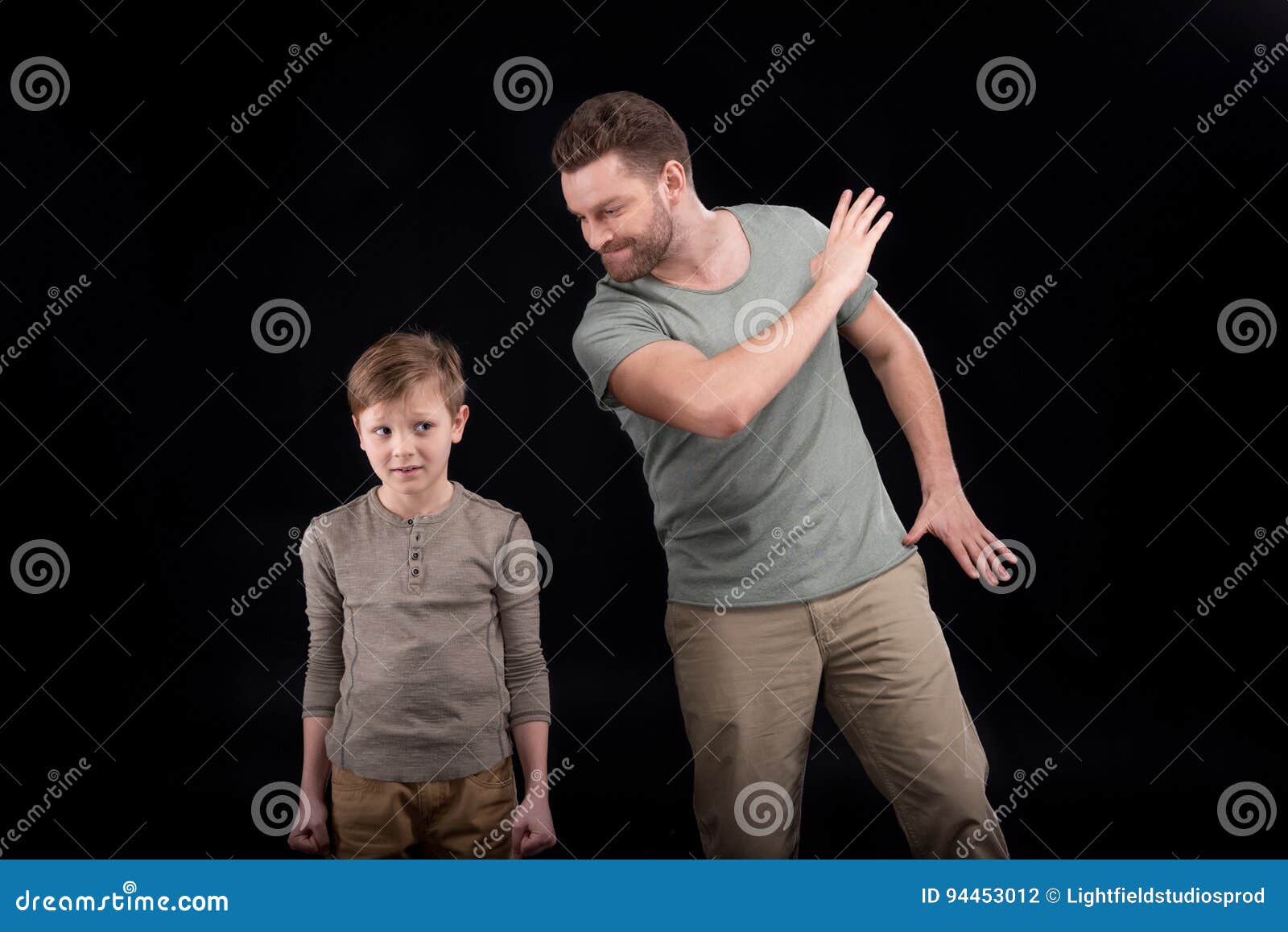 Angry Father Threatening and Gesturing To Scared Little Son, Stock ...