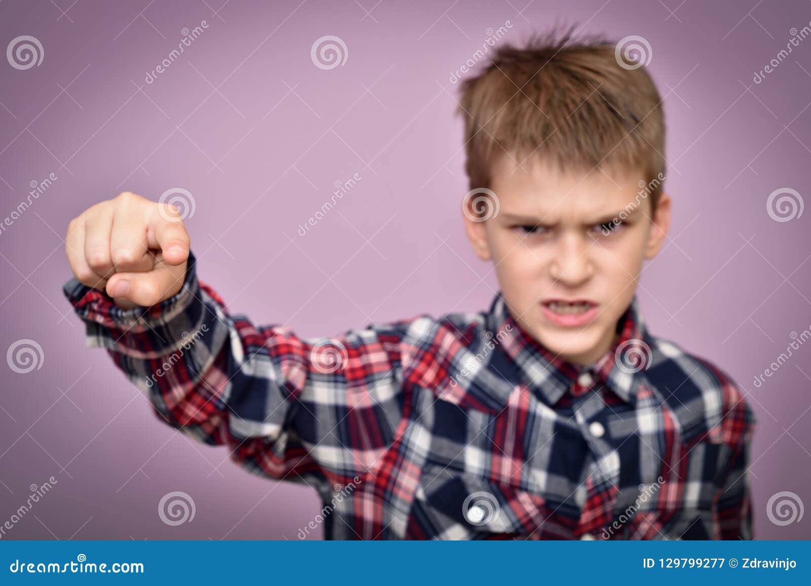 Angry and Furious Young Boy Stock Image - Image of finger, fury: 129799277