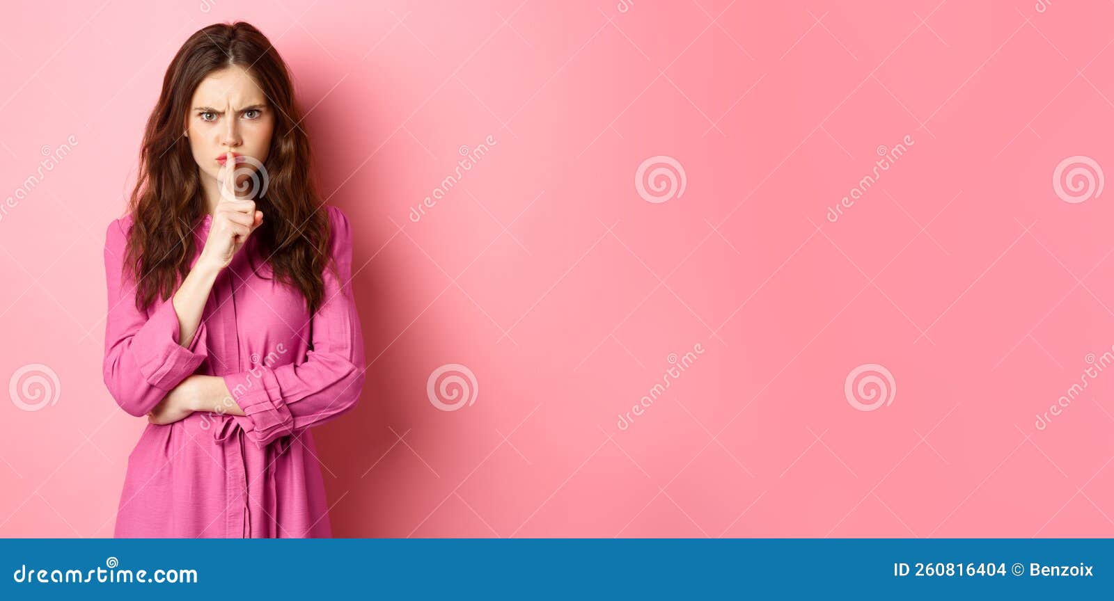 Angry Girl Frowning Displeased Shushing At Camera Press Fingers To