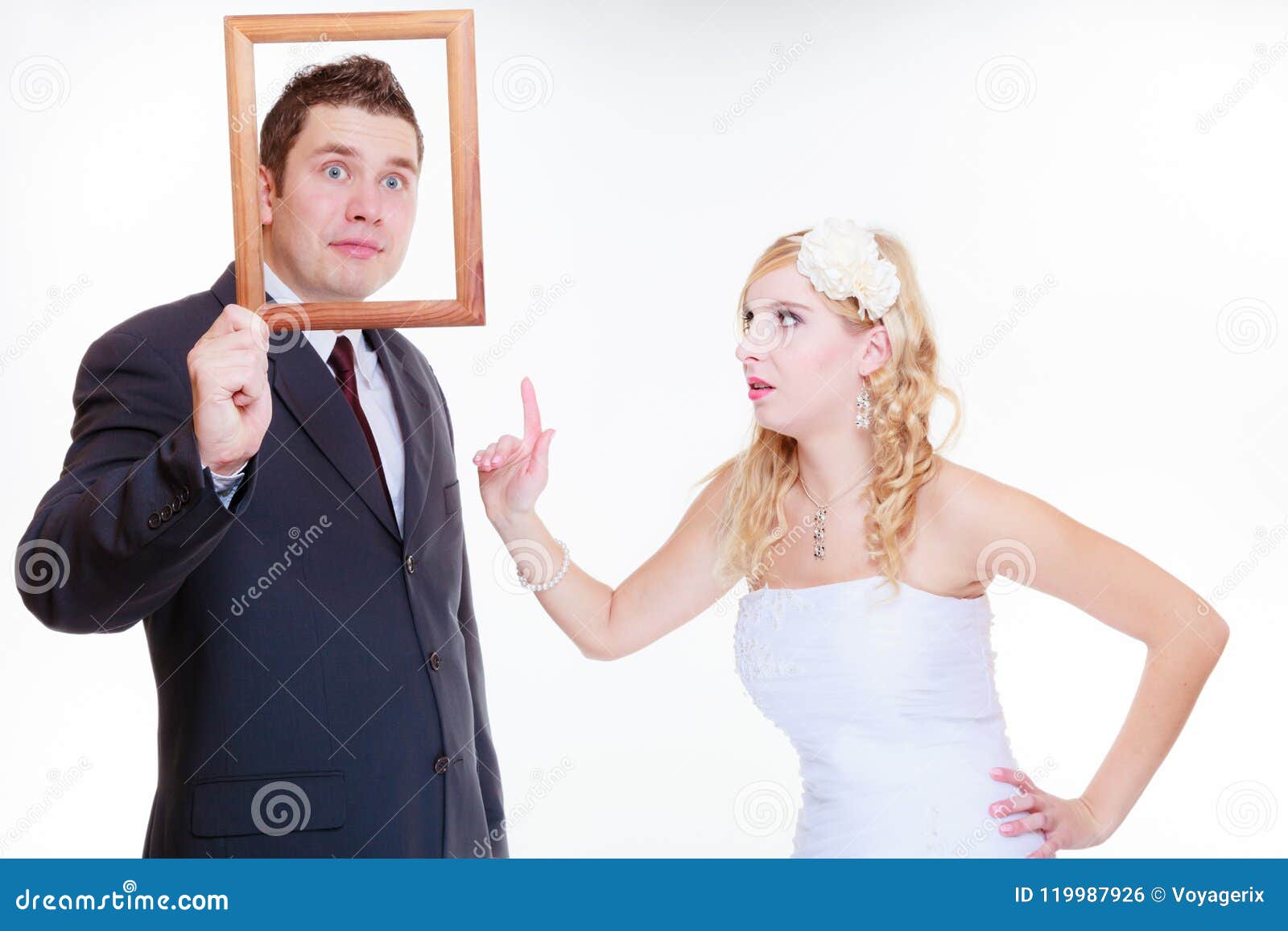 Angry Groom and Bride Holding Empty Frame Stock Photo - Image of couple ...