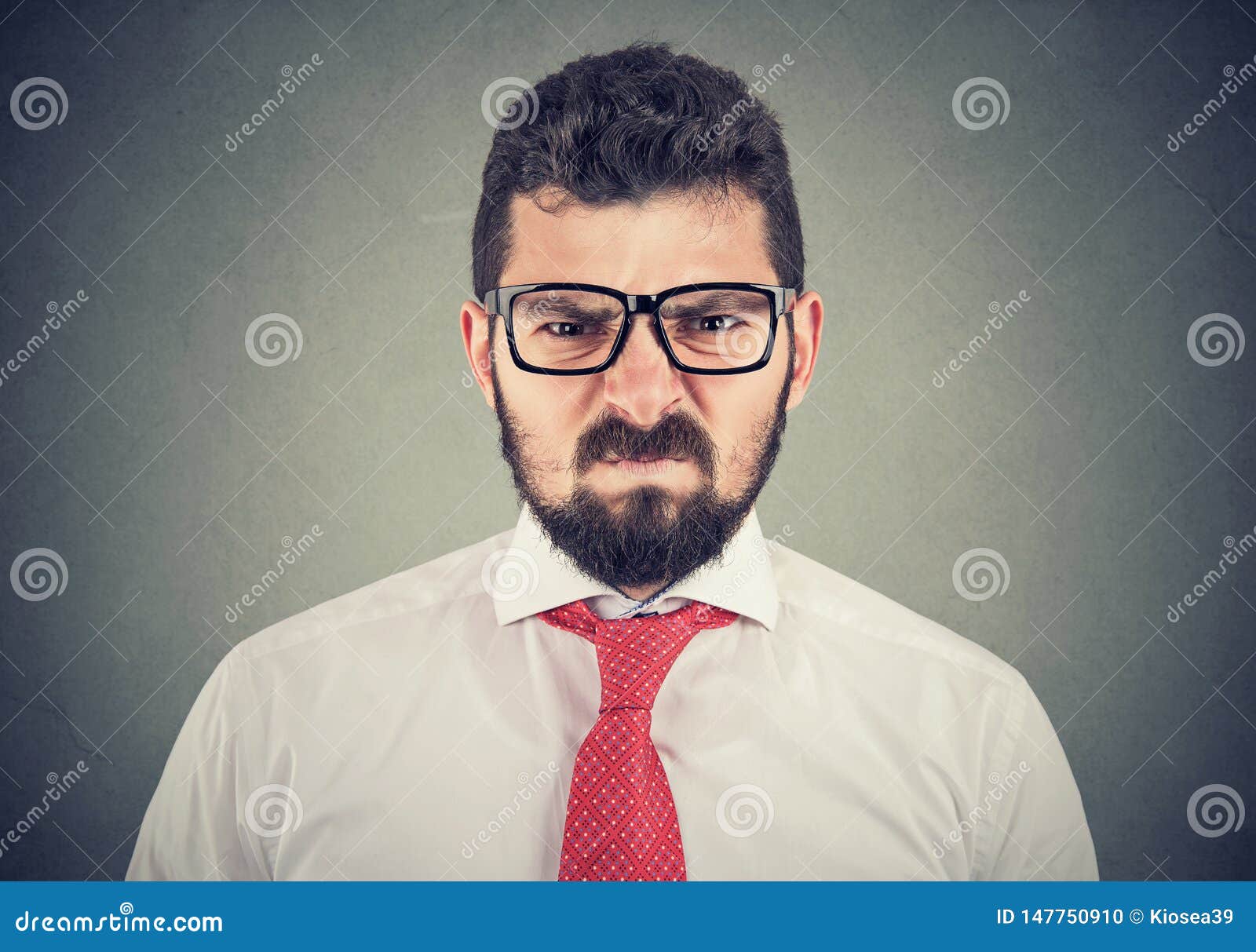 Angry Grumpy Female Dressed Casually Keeping Arms Folded, Looking At ...