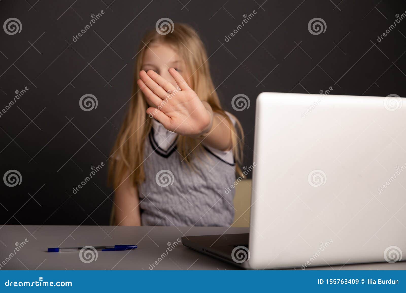 Angry Kid Showing Stop Sign Isolated Infront of the Computer. Stock ...