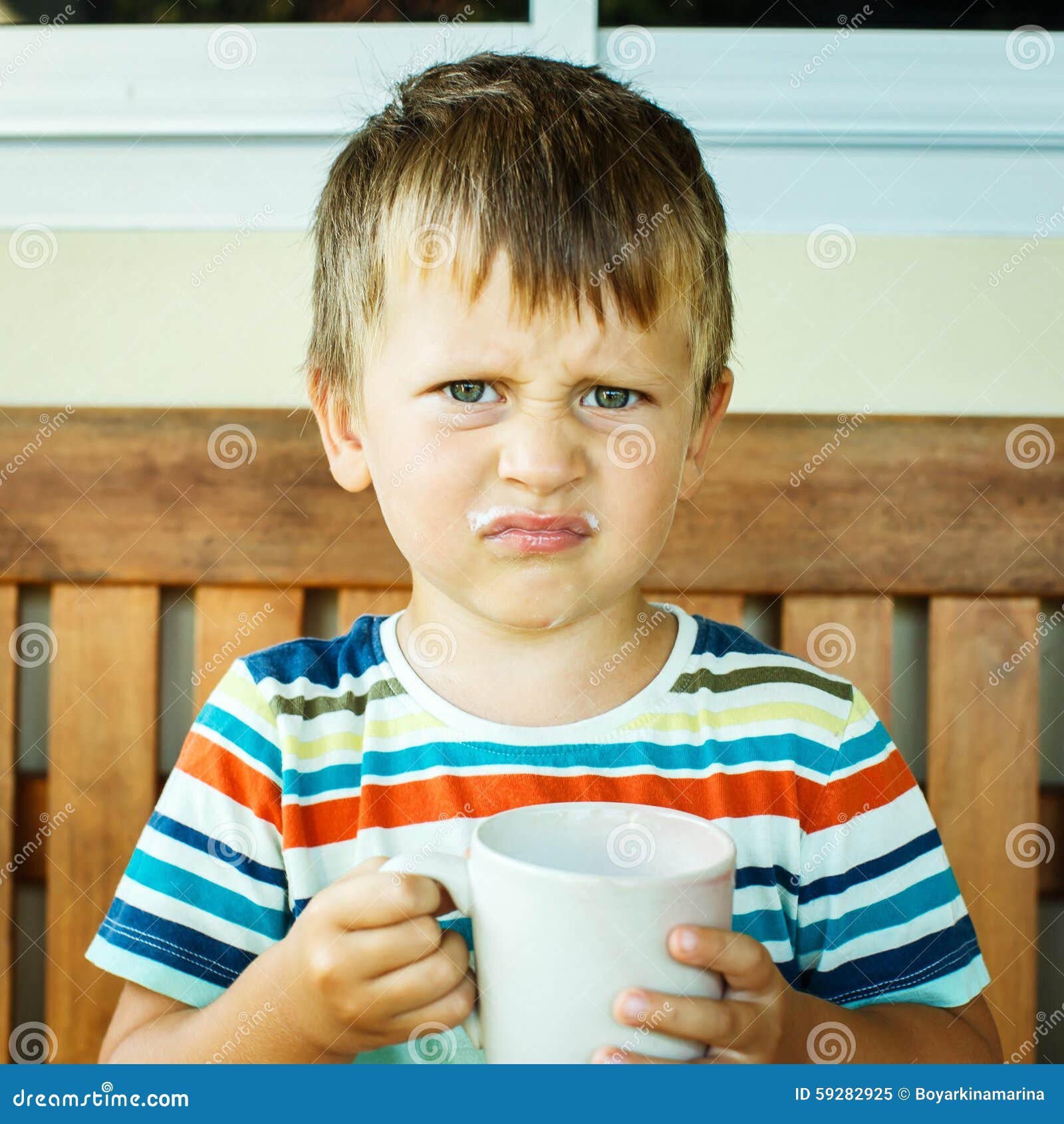 Angry Little Boy Drinking Milk Stock Image - Image of little, natural ...