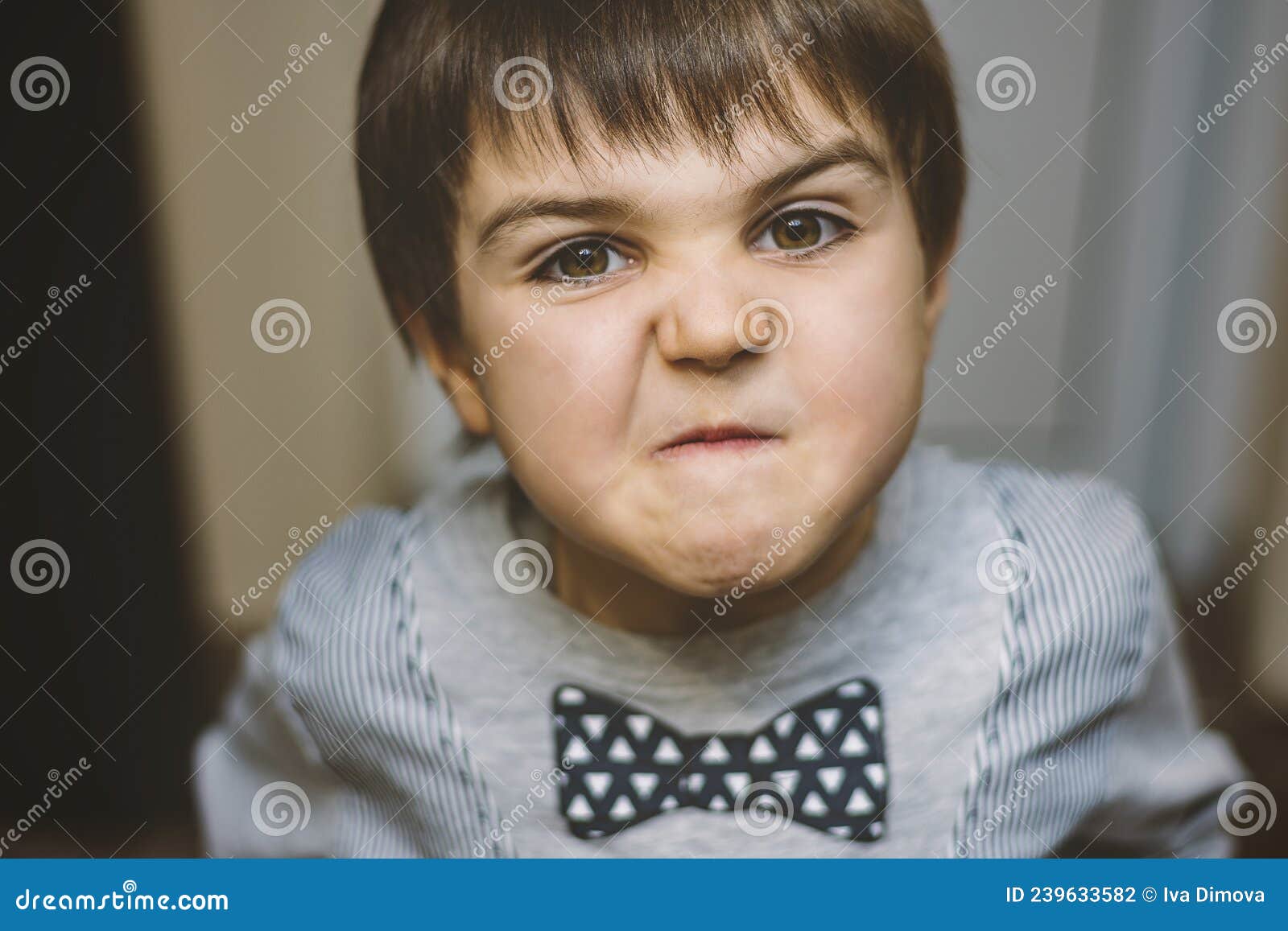 Angry Little Boy Glaring at the Camera Stock Photo - Image of childhood ...