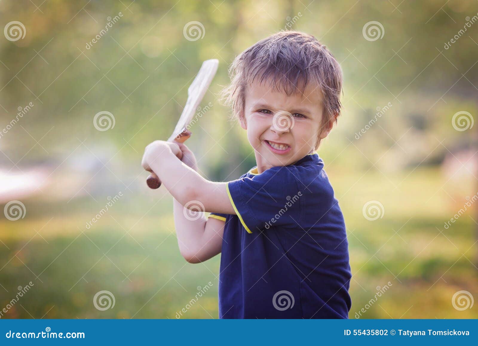 Angry Little Boy, Holding Sword, Glaring with a Mad Face at the Stock ...