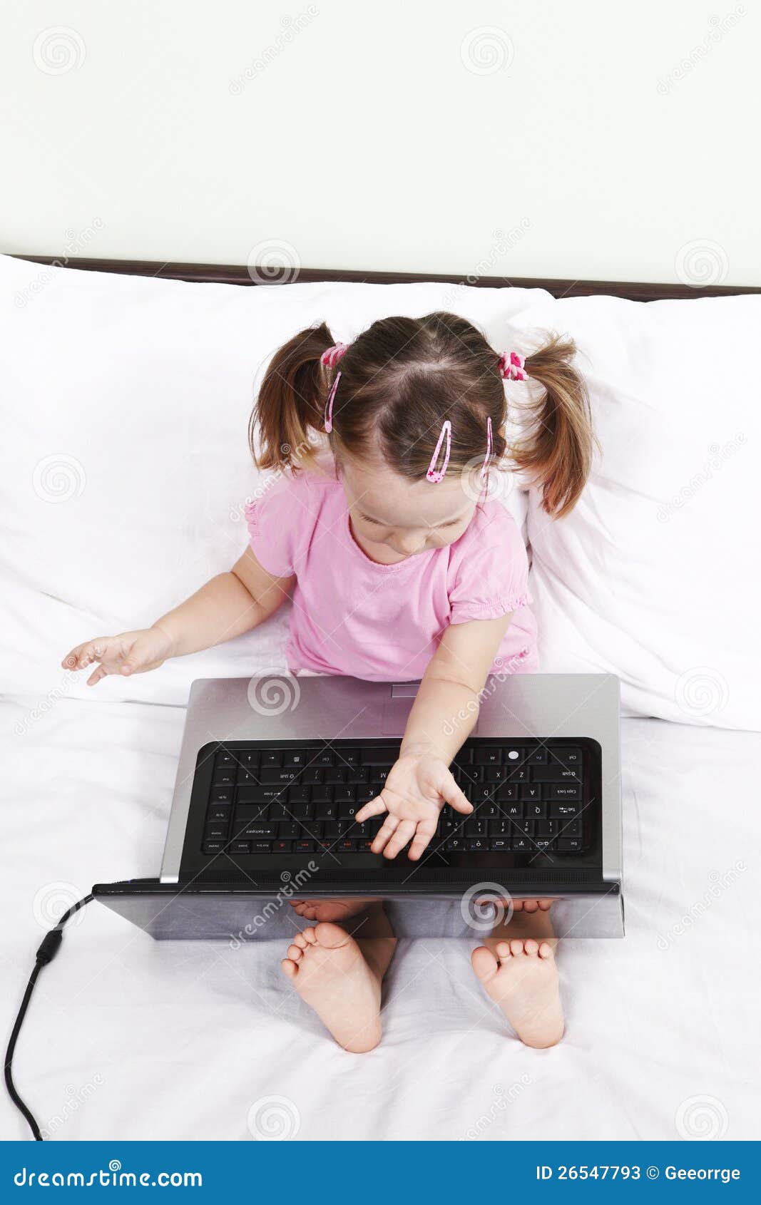 Angry Little Girl Sitting in Front of a Laptop Stock Image - Image of ...