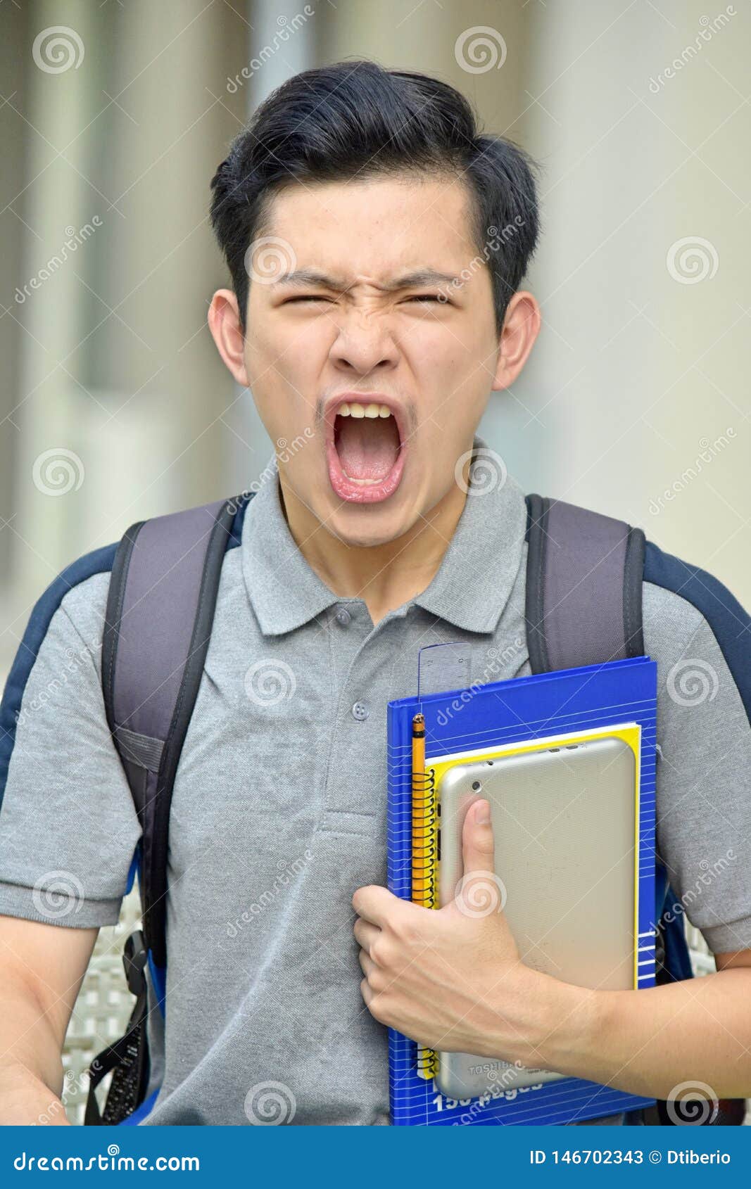Angry Male Student with Books Stock Image - Image of male, books: 146702343
