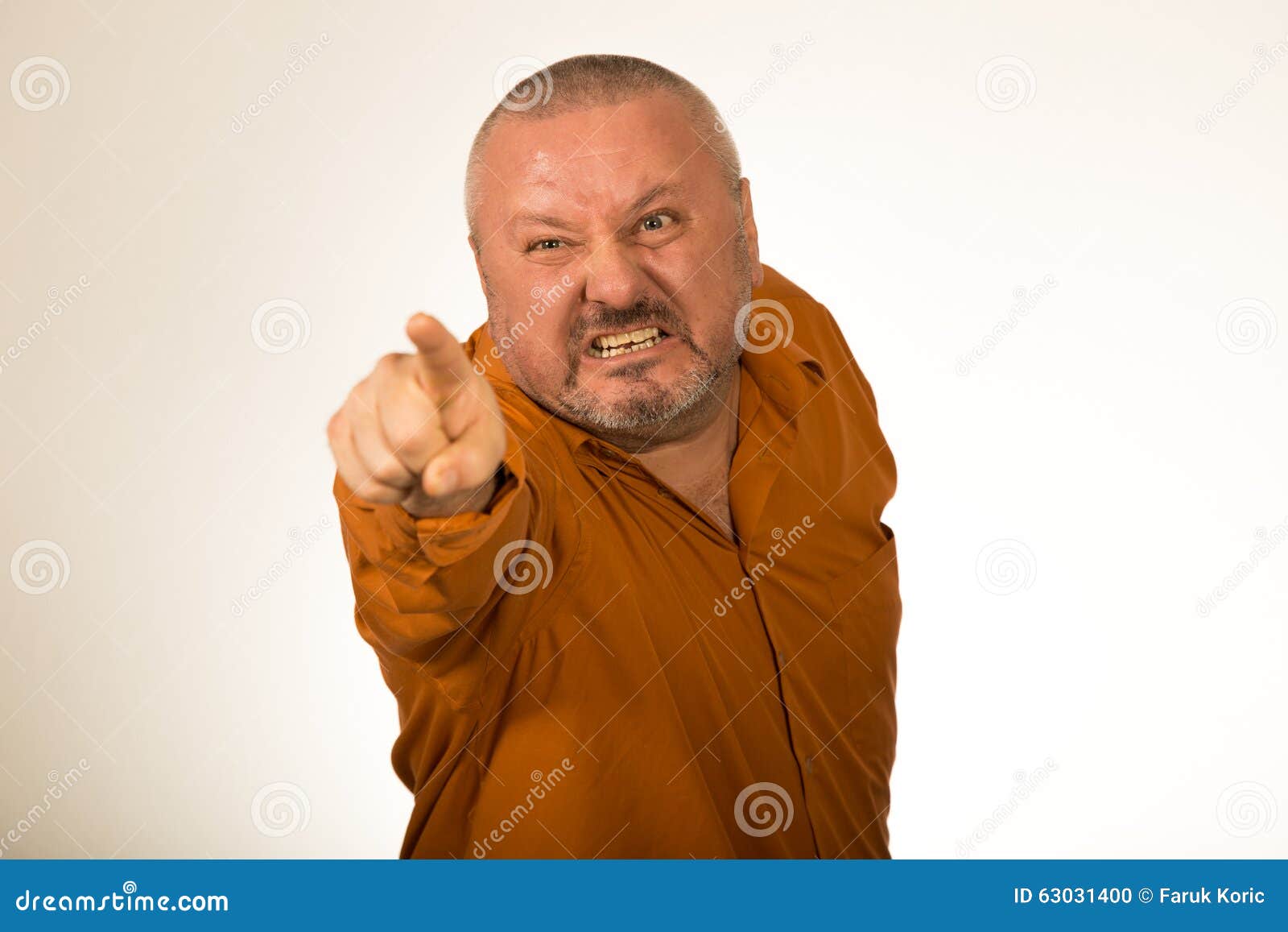 Angry Man with a Beard Baring His Teeth and Snarling at the Camera ...