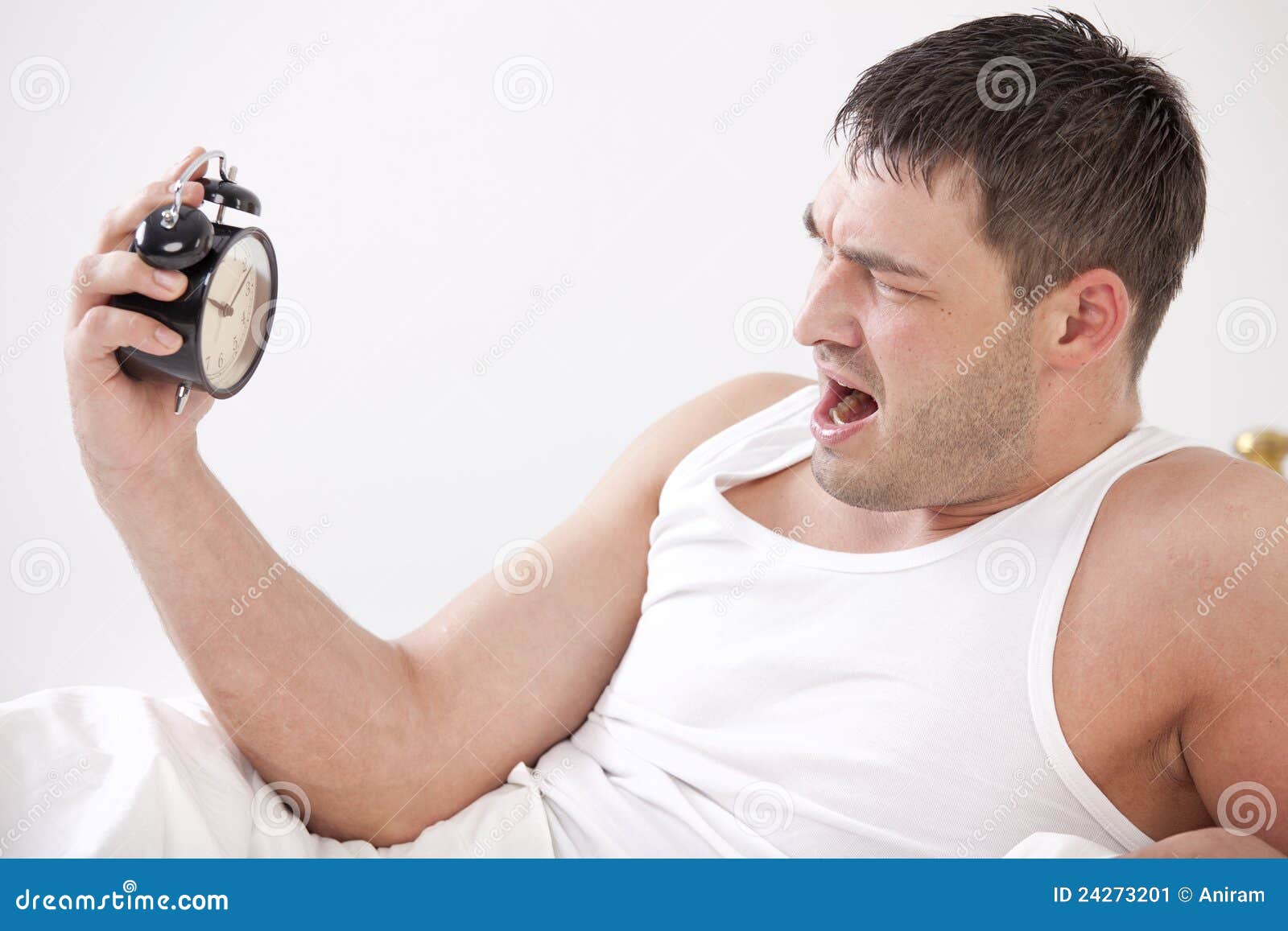 Angry Man in Bed with Alarm Clock Stock Image - Image of frustrated ...